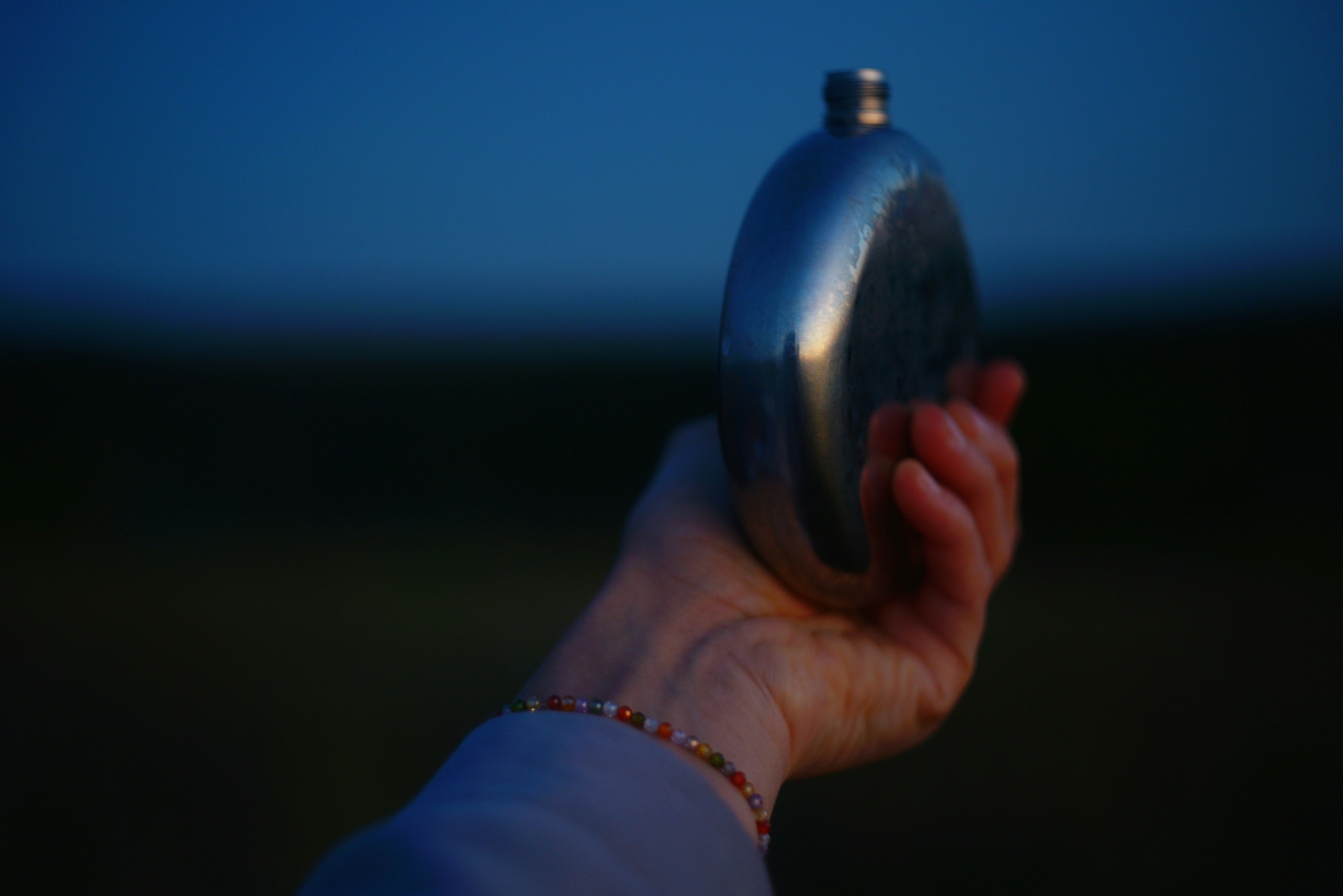 Nightfall Treasure: A Hand Clutching a Pocket Watch