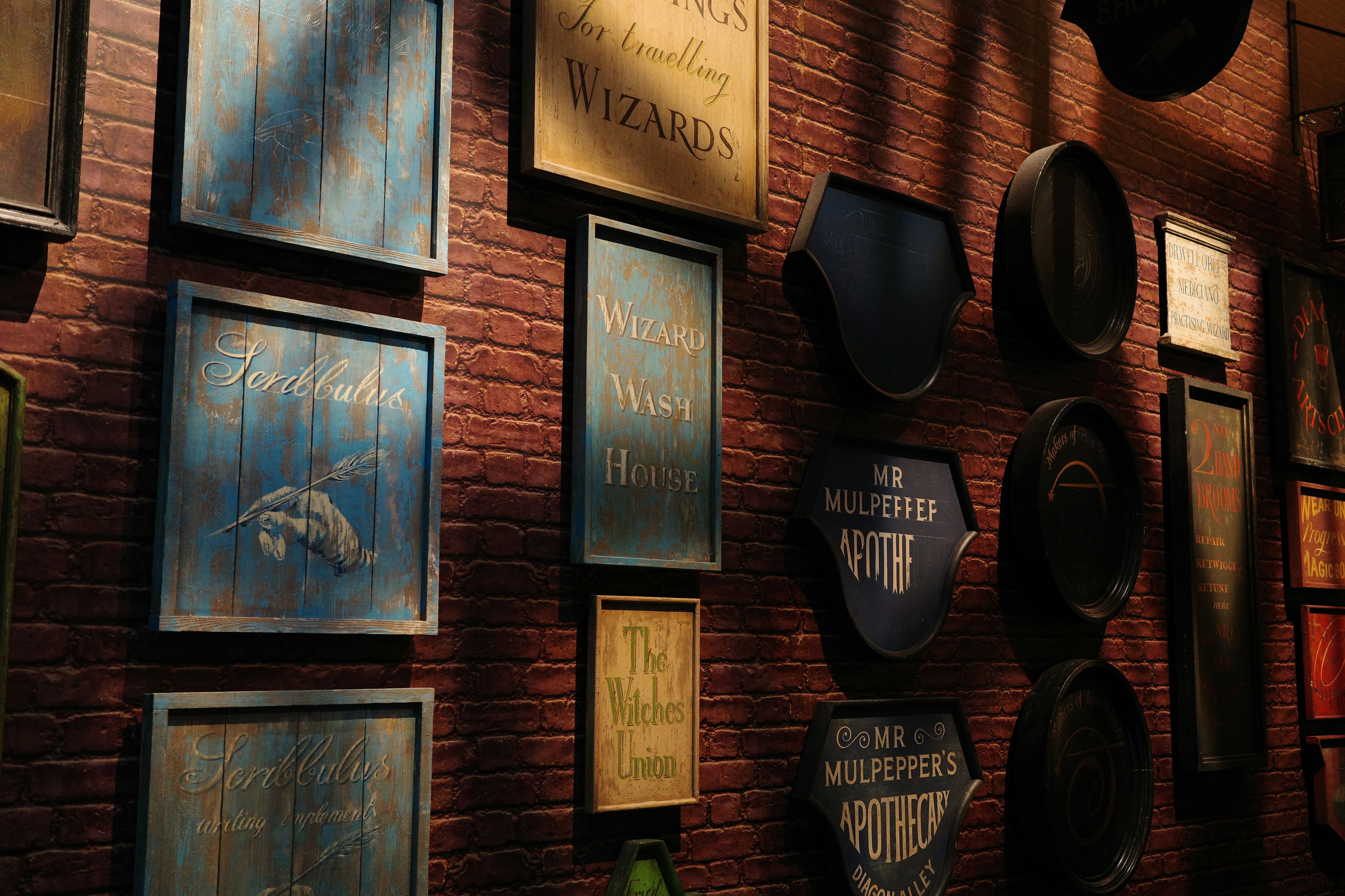 Warded Wall of Wizardry: Framed Spells in a Rustic Brick Gallery