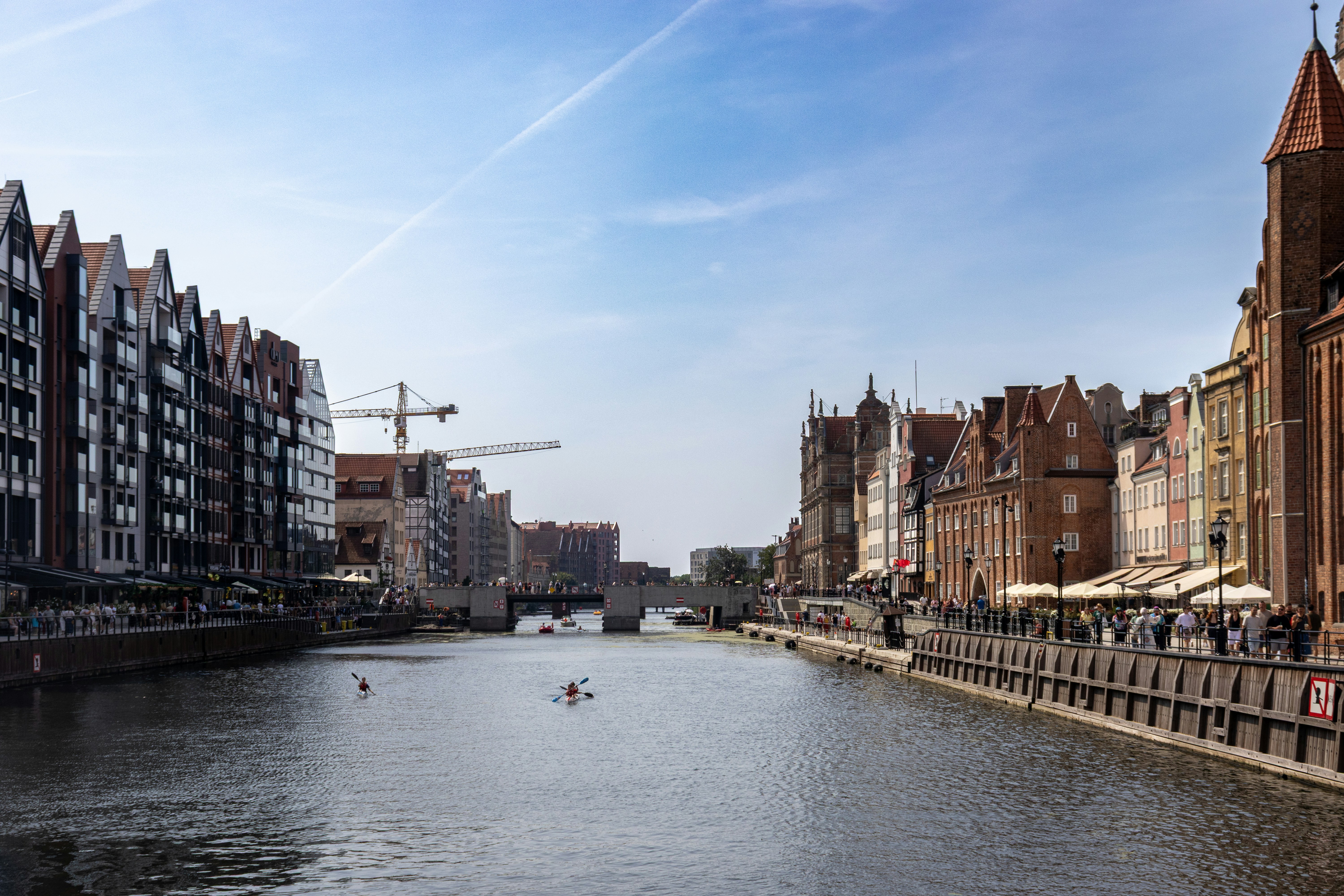 Canal Edge Echoes: Brick Facades and Waterfront Life
