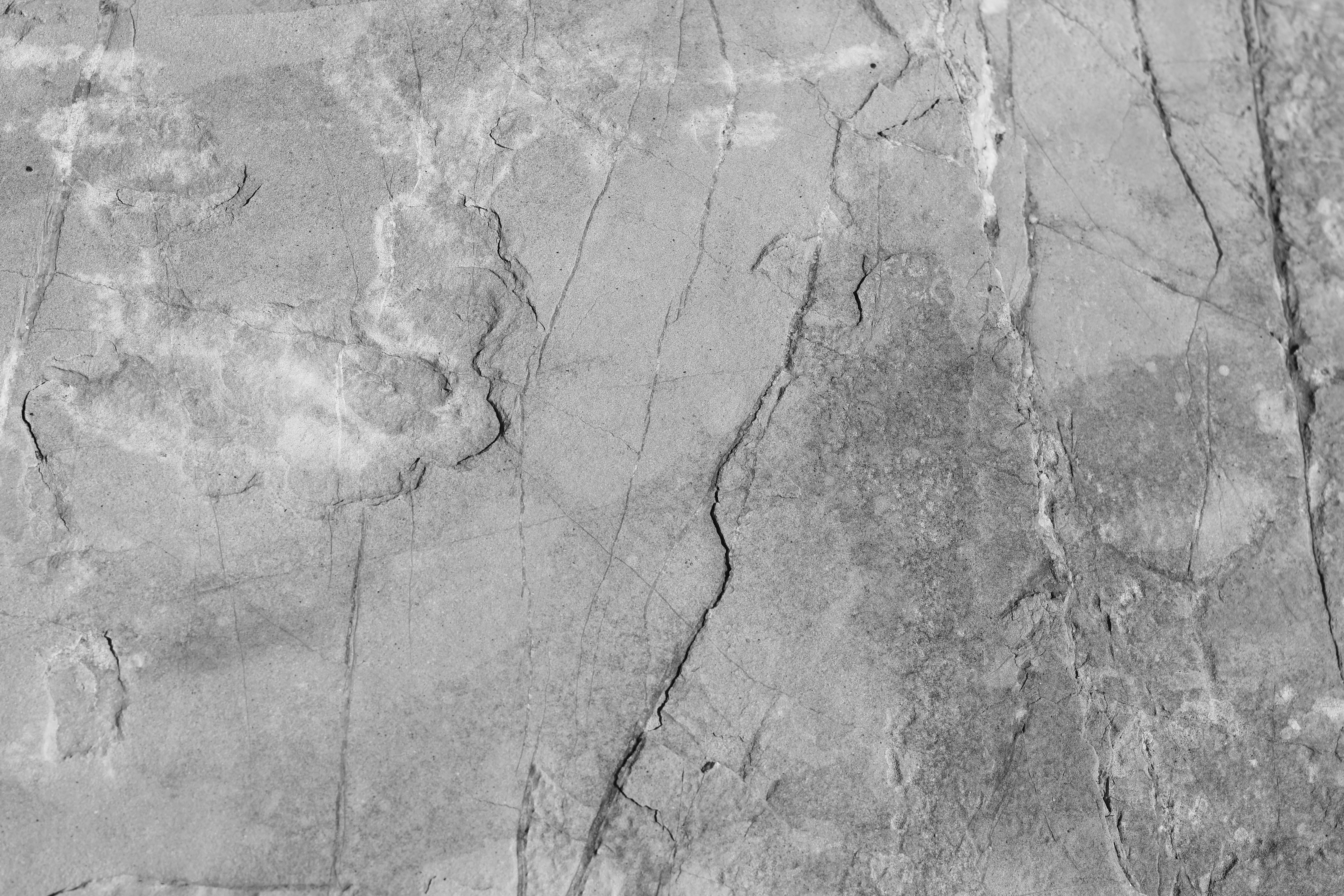 Weathered Granite: Subtle Veins and Quiet Light on Stone
