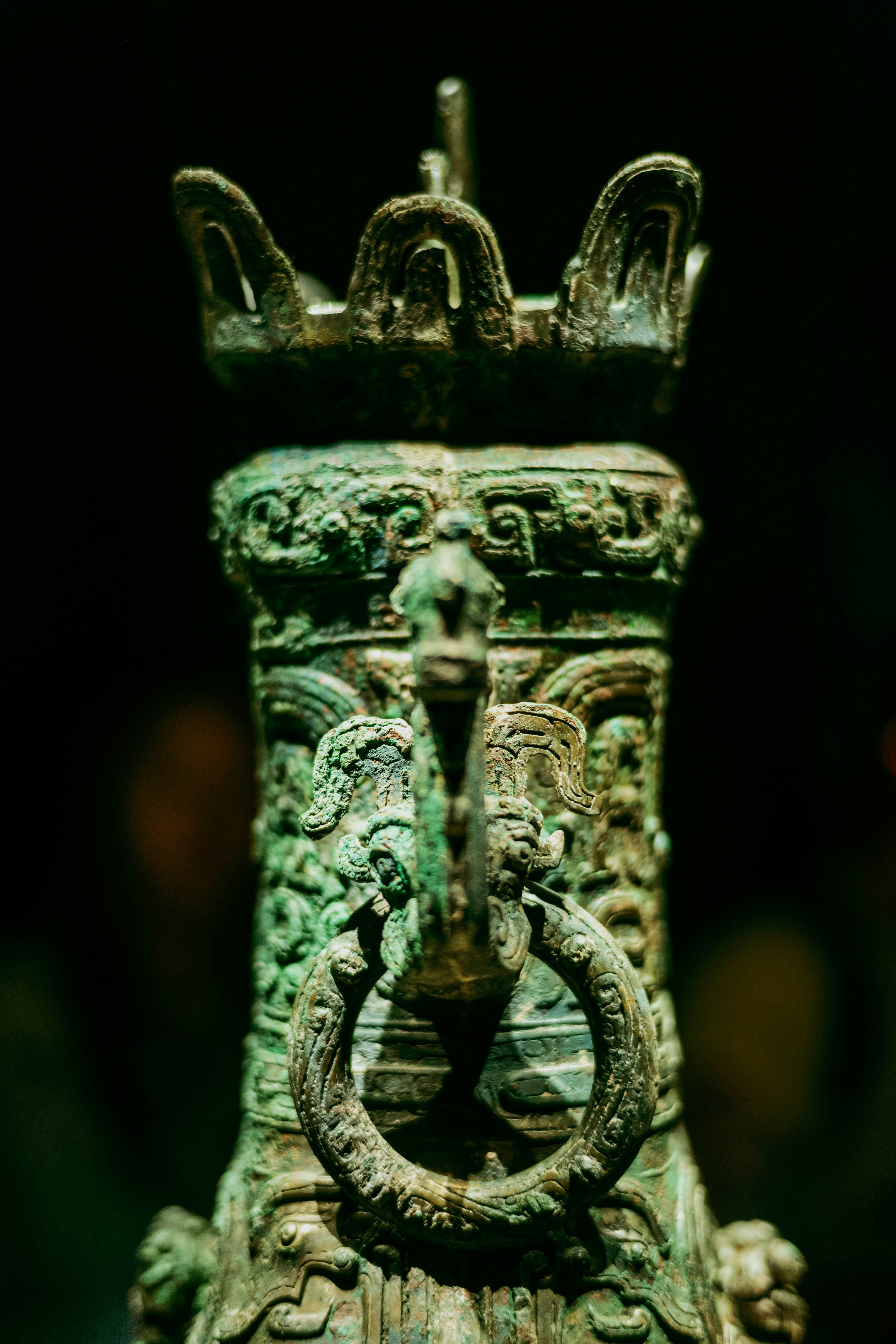 Ancient Crowned Emblem: A Closer Look at Time-Worn Ornamentation