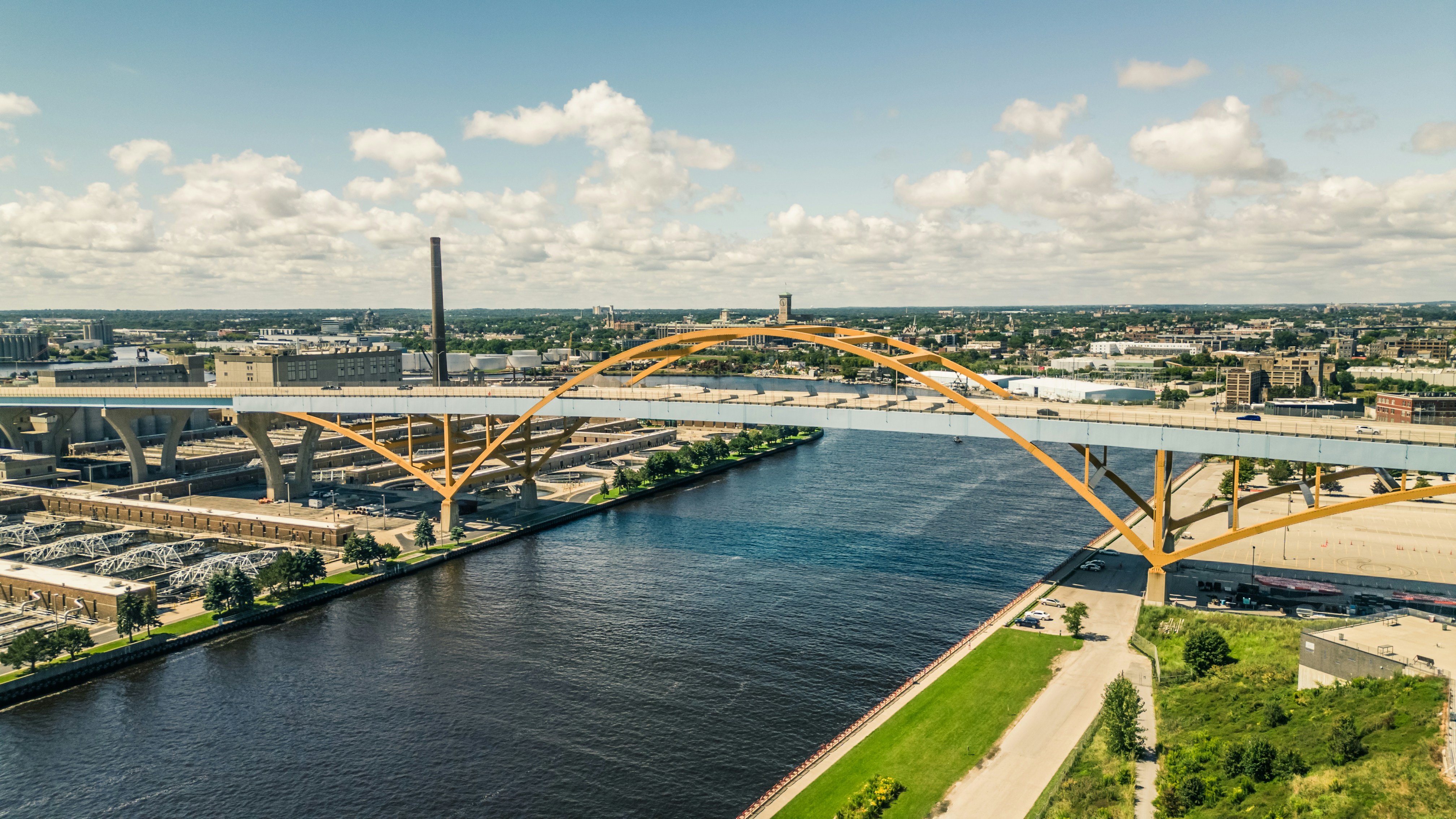 Golden Arches Over the River: Aerial View of the City Bridge