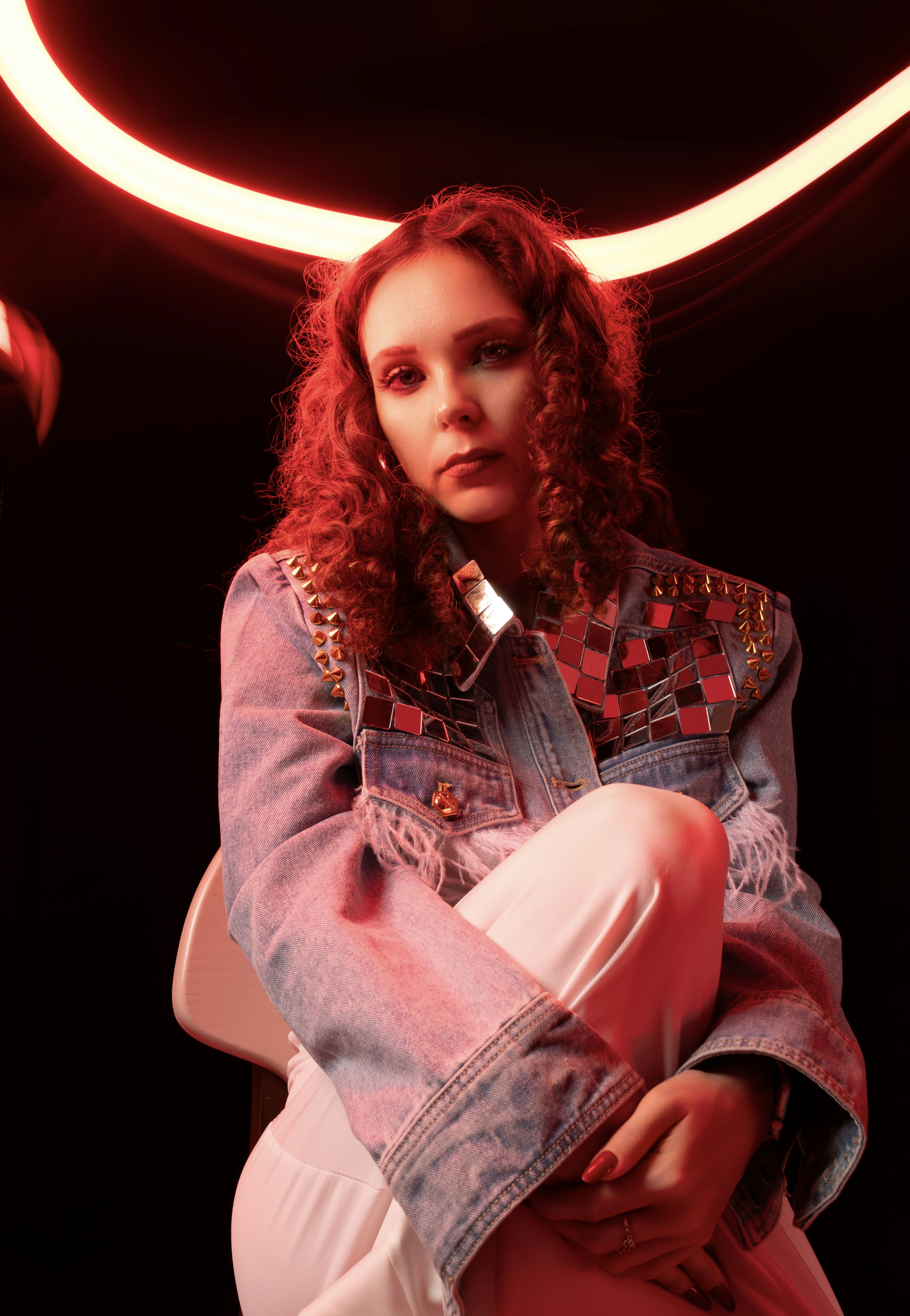 Neon Aura: A Quiet Moment Beneath the Ring of Light