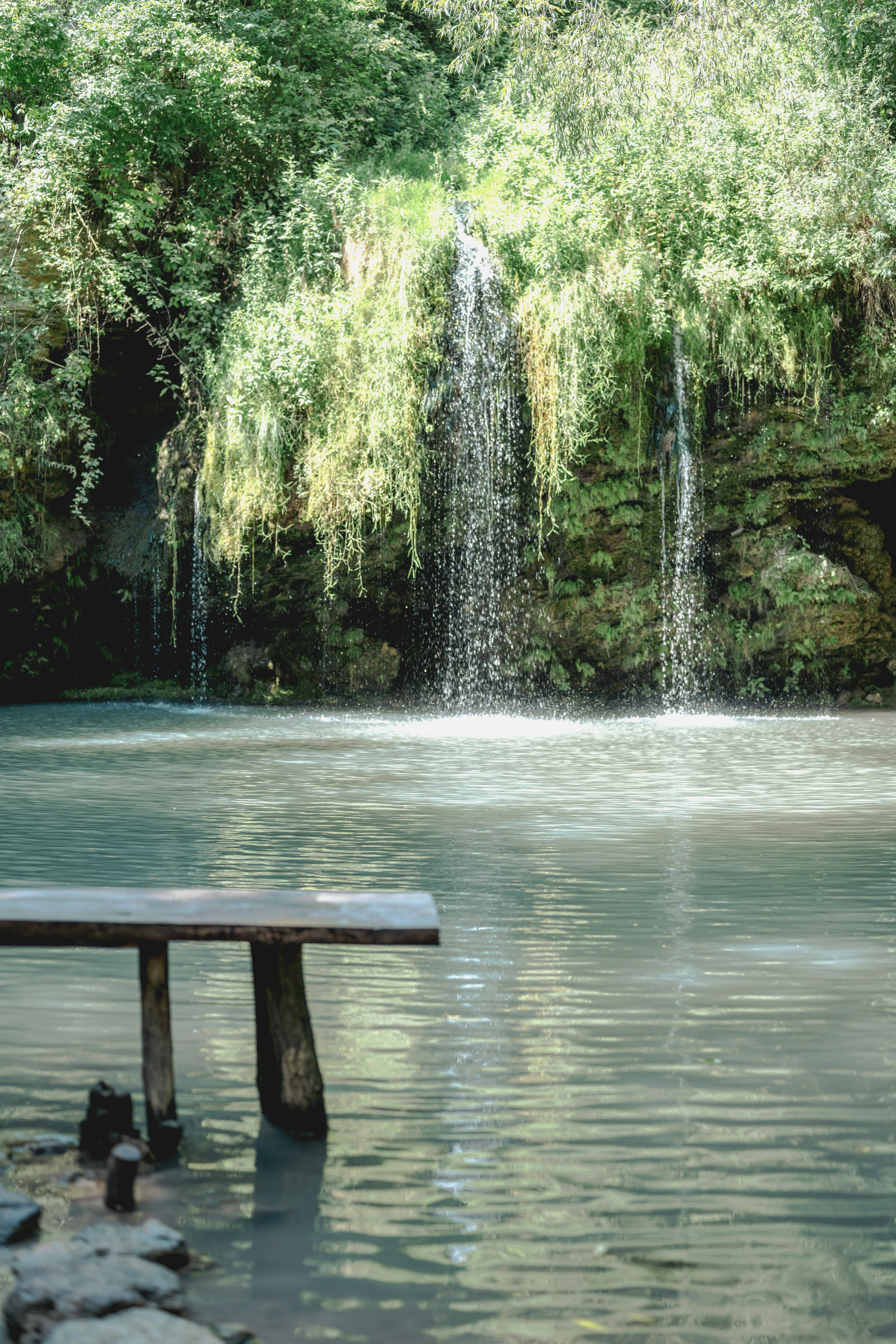 Hidden Falls Over Turquoise Mirror