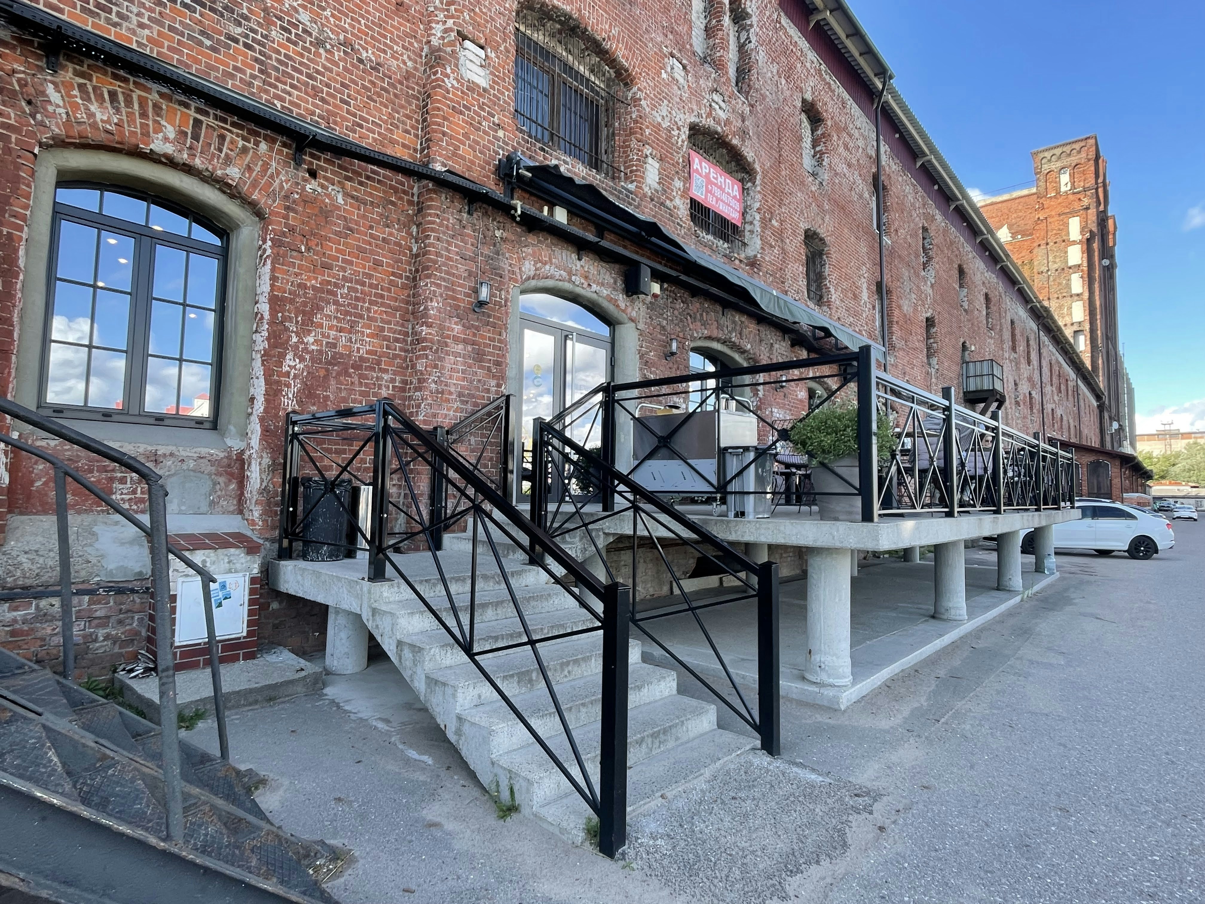 Brick Warehouse Exterior with Elevated walkway and Railings