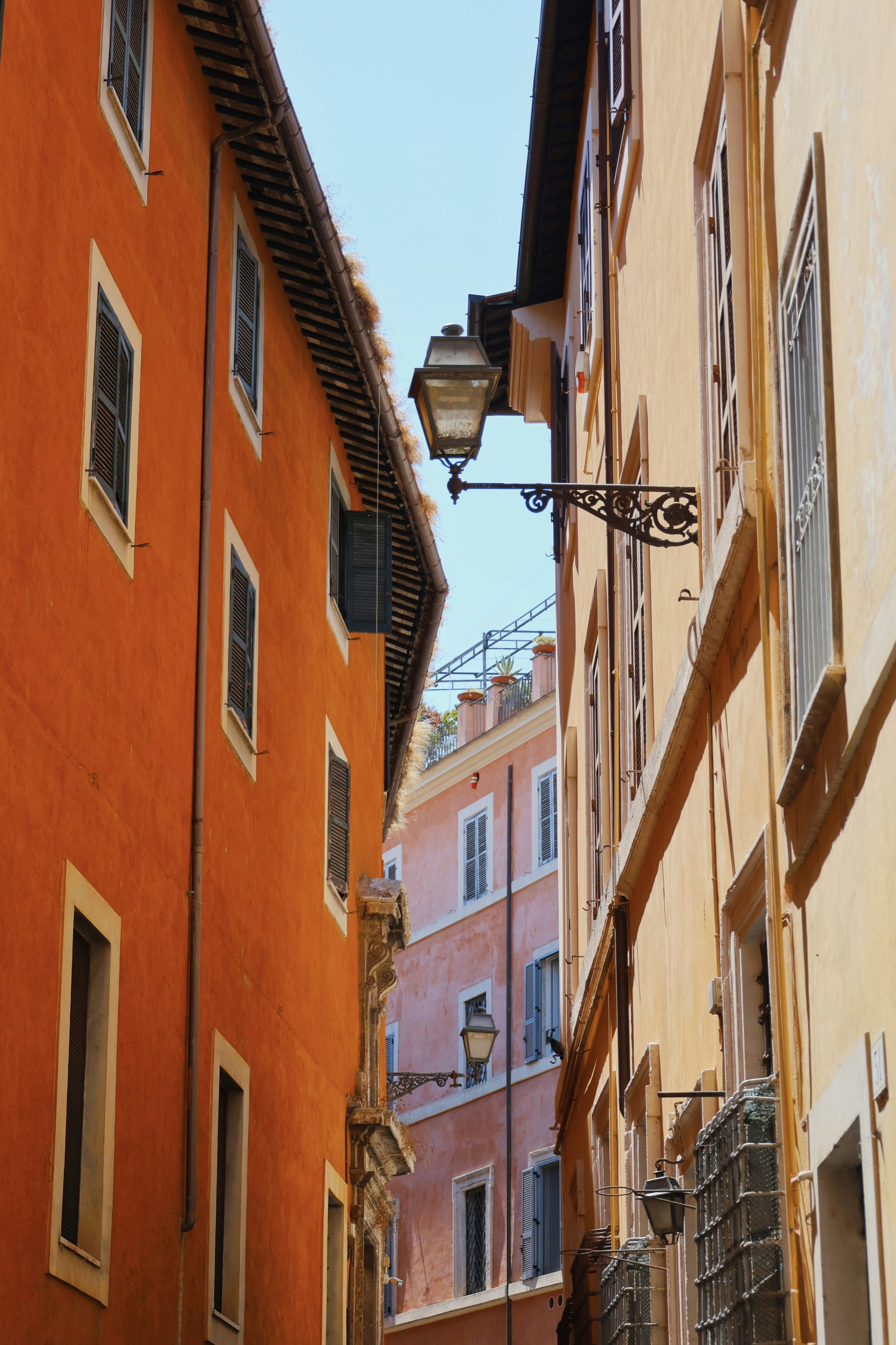 Colored Alleyway: Sunlit Facades Between Narrow European Streets