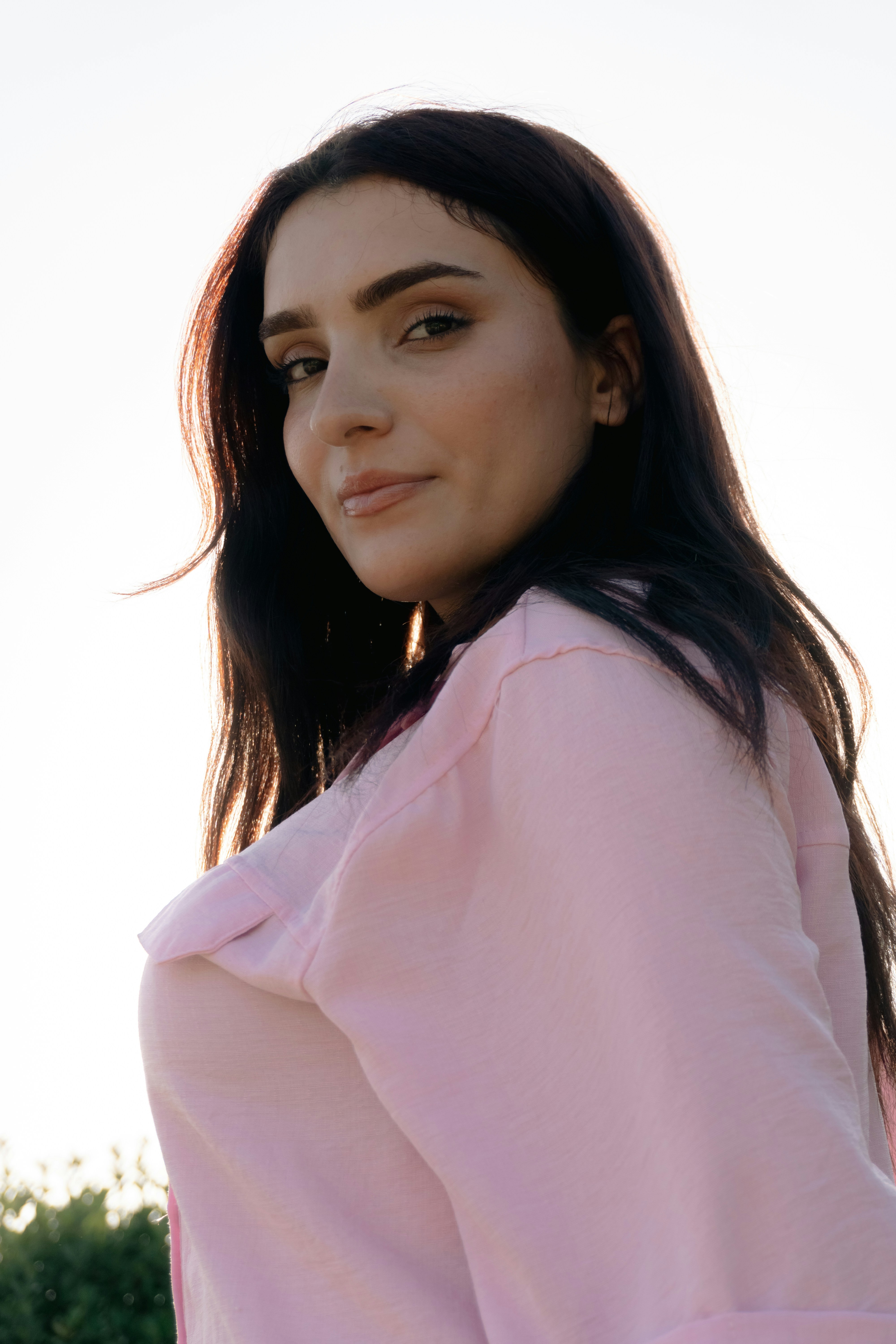 Soft Sunset Portrait: A Quiet Confidence in Pink