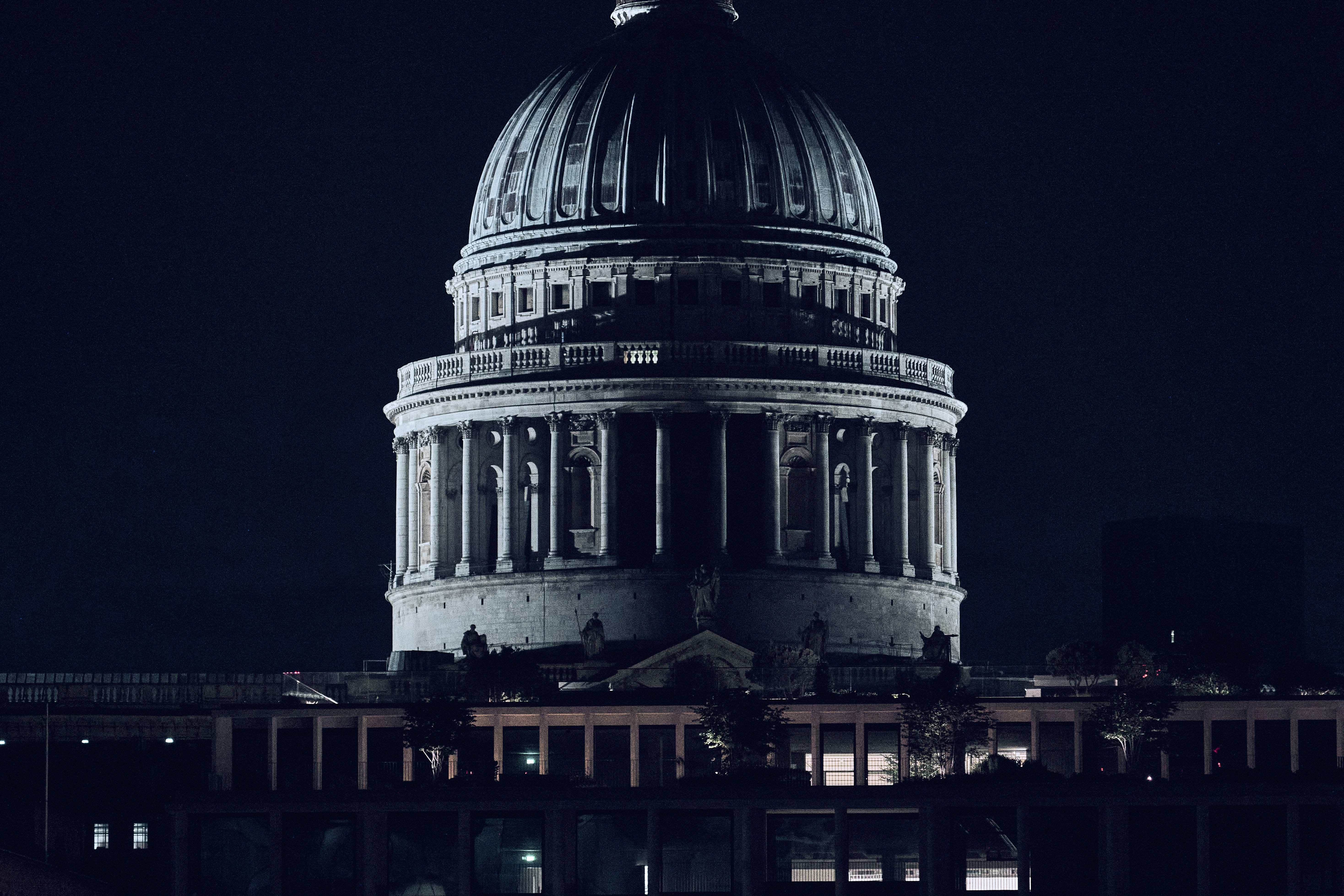 Moonlit Dome: Stately silhouette of a grand capitol under night sky