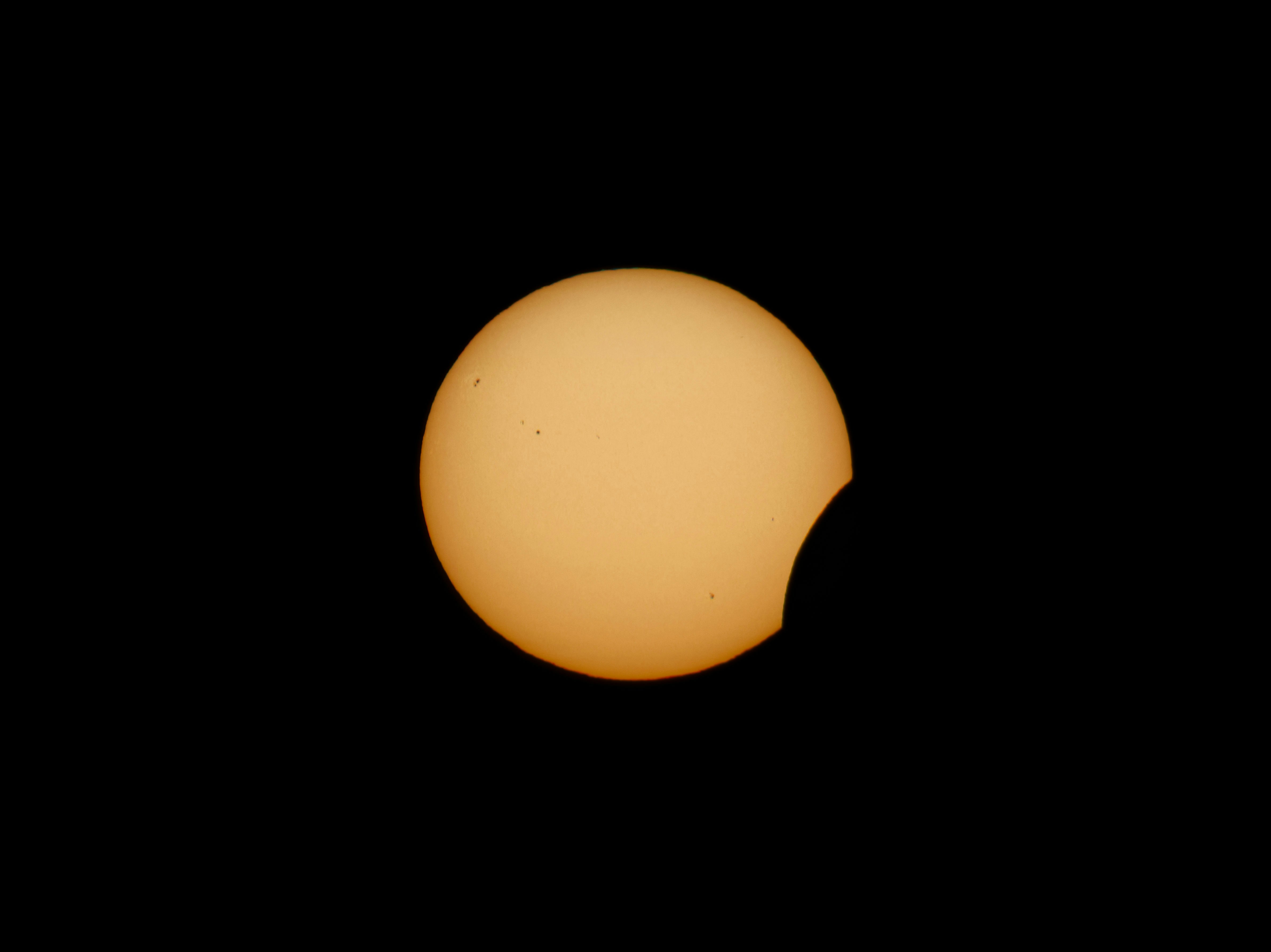 Phantom Crescent: A Solar Eclipse Moment