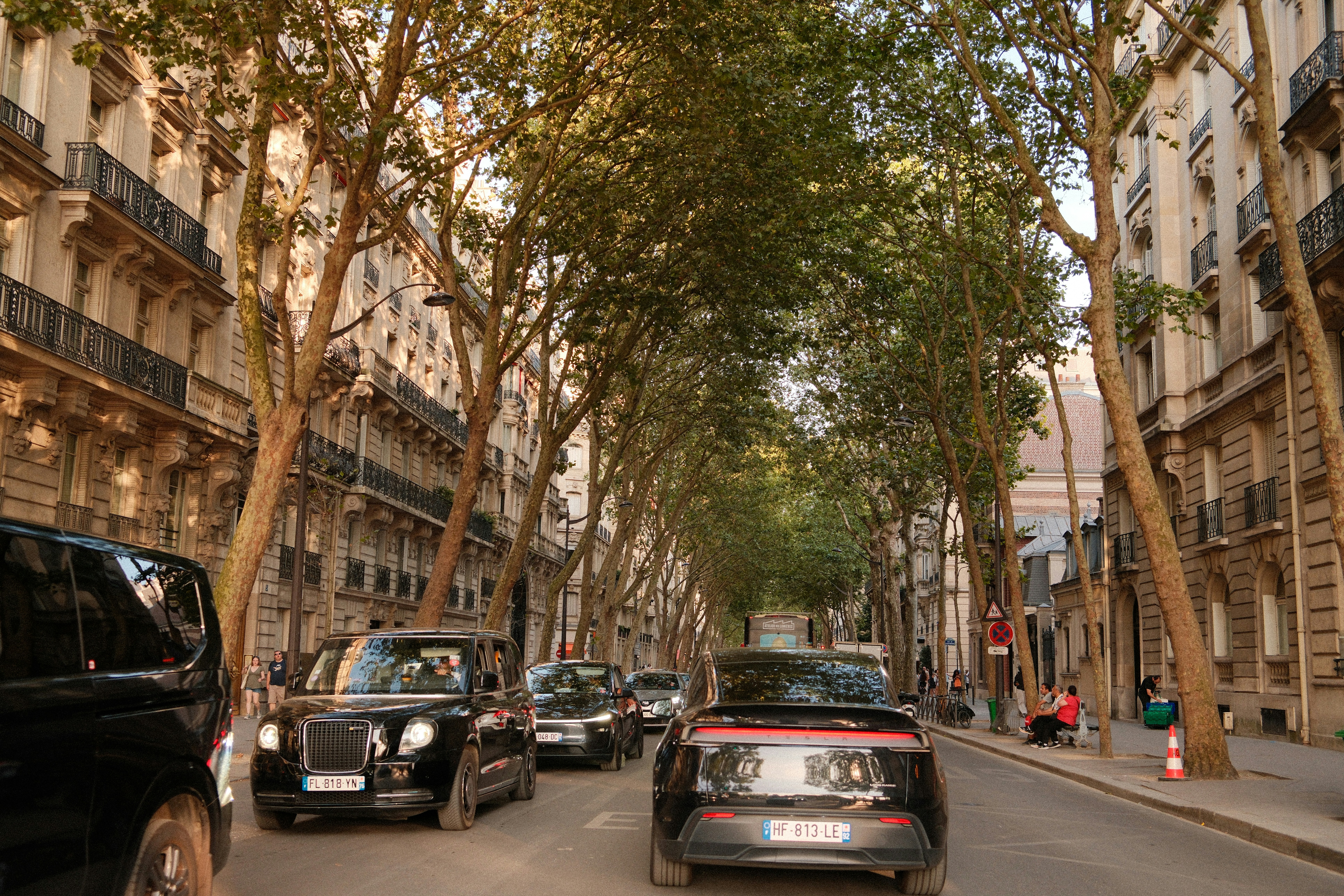 Parisian Boulevard Breathes Through Moving Traffic
