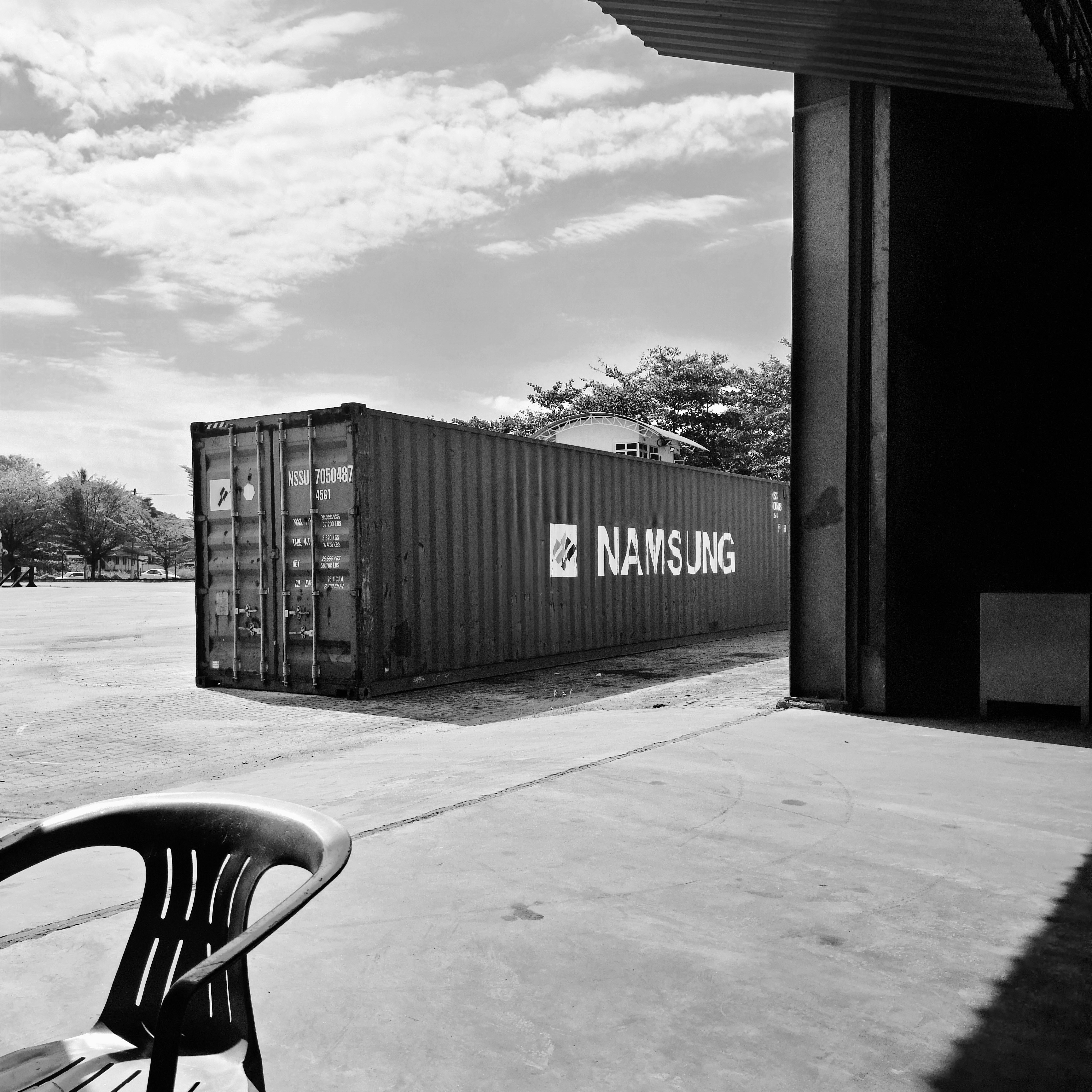 Container Drift: A Stark monochrome at the Loading Yard