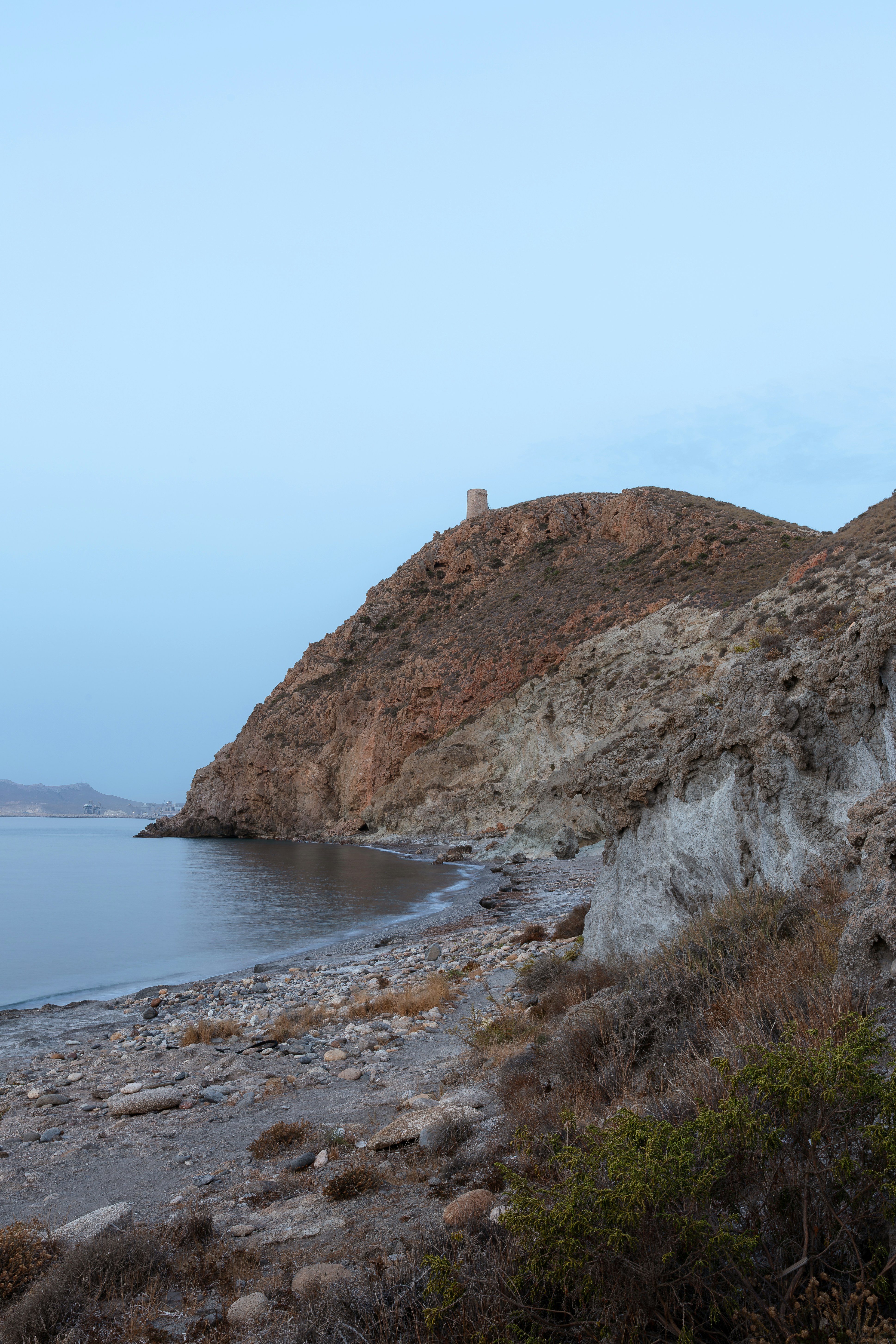 Cliffside Sentinel Overlooking a Quiet Bay