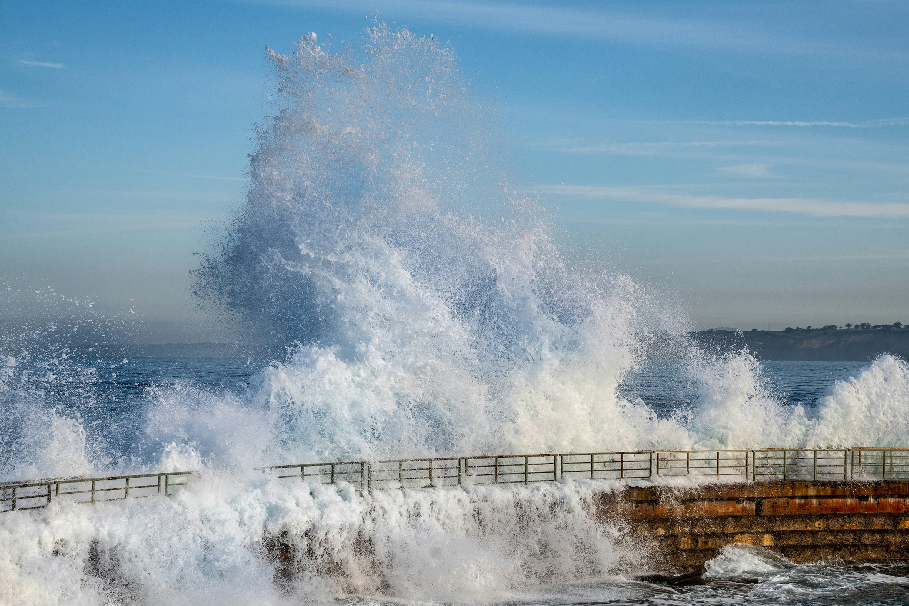 Crashing Crest: A Wave Break at the Harbor Breakwall