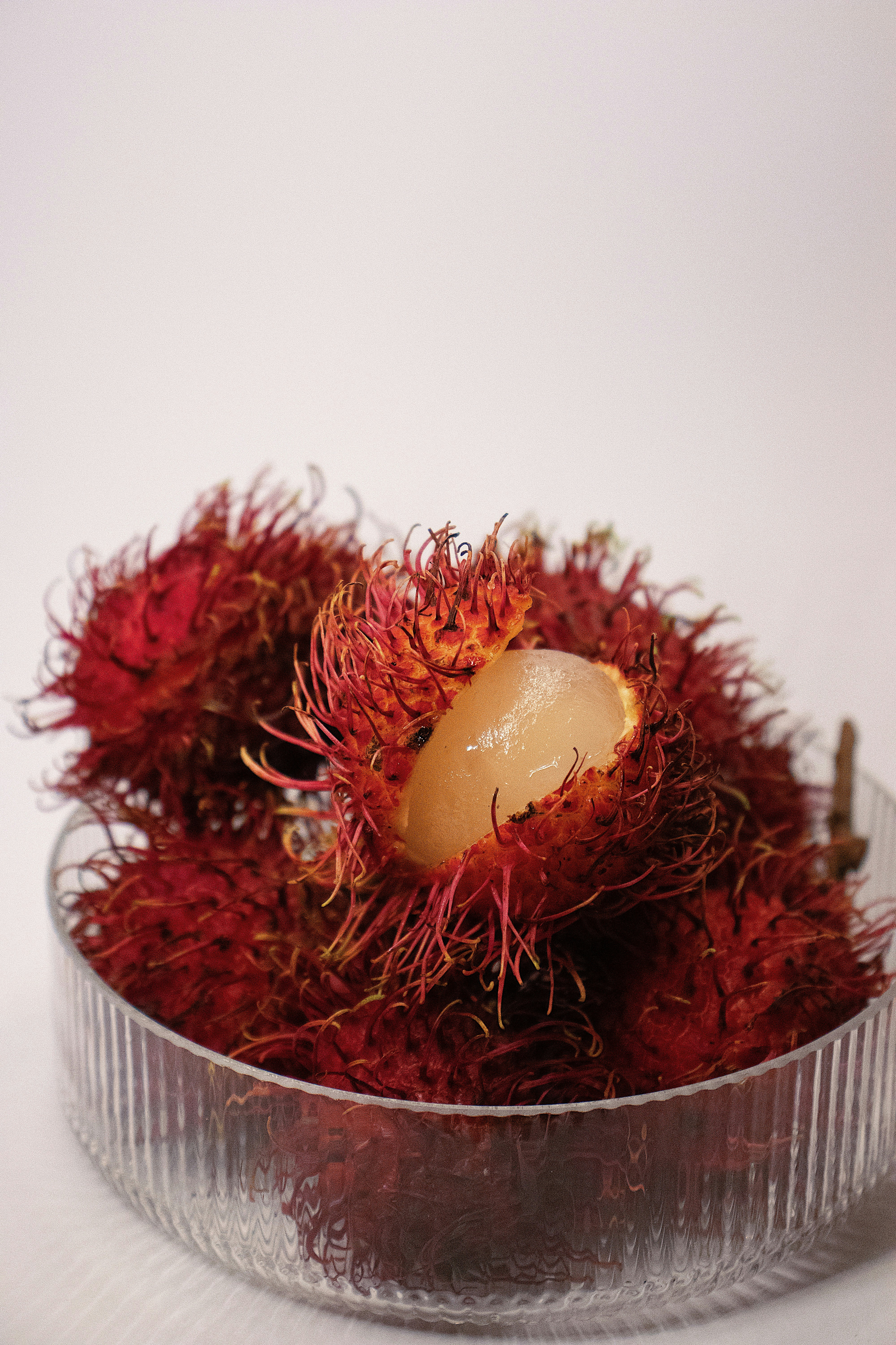 Fresh Rambutan Crowned in Red Spikes