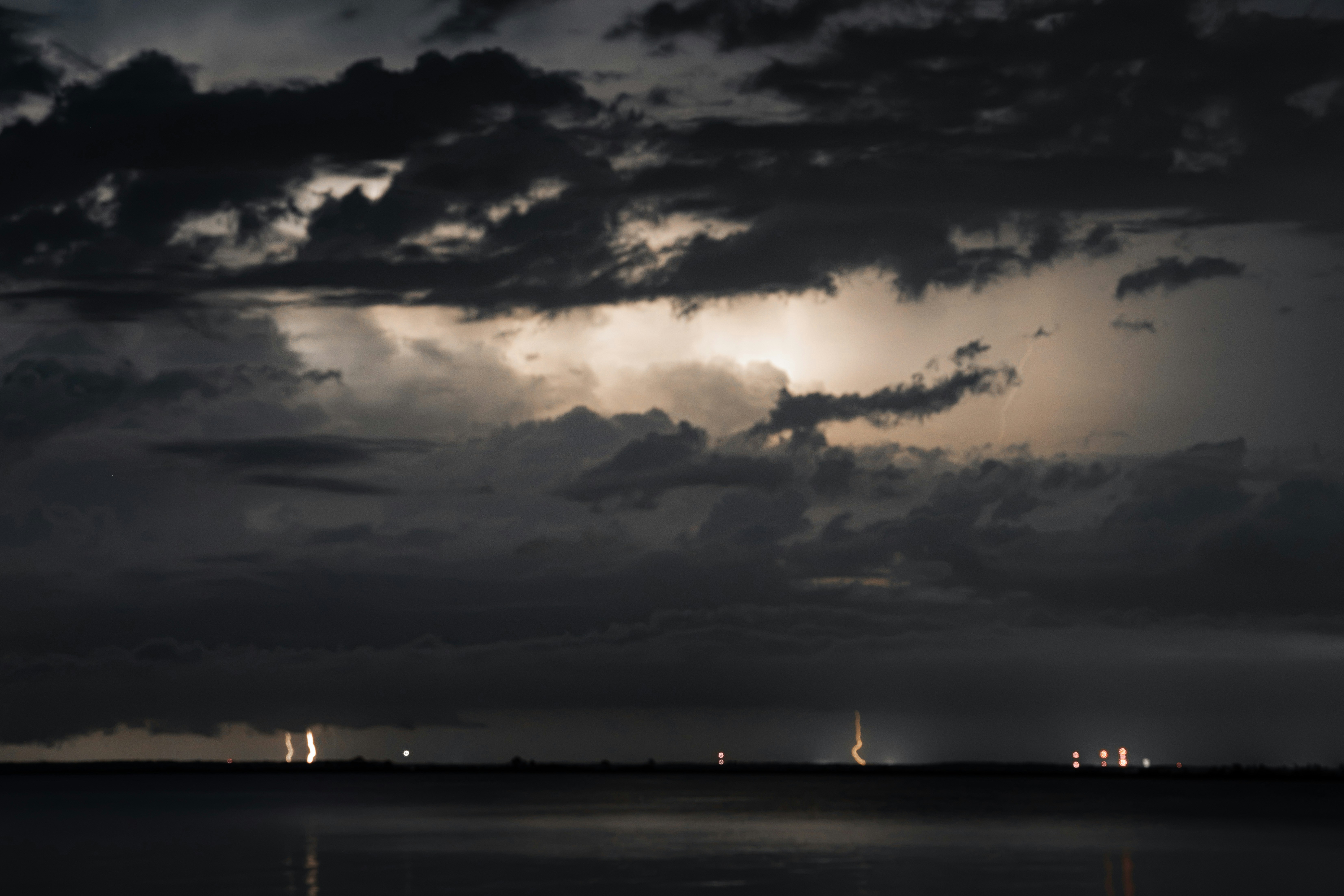Low Light Lightning: Distant Strikes Beyond a Silent Horizon