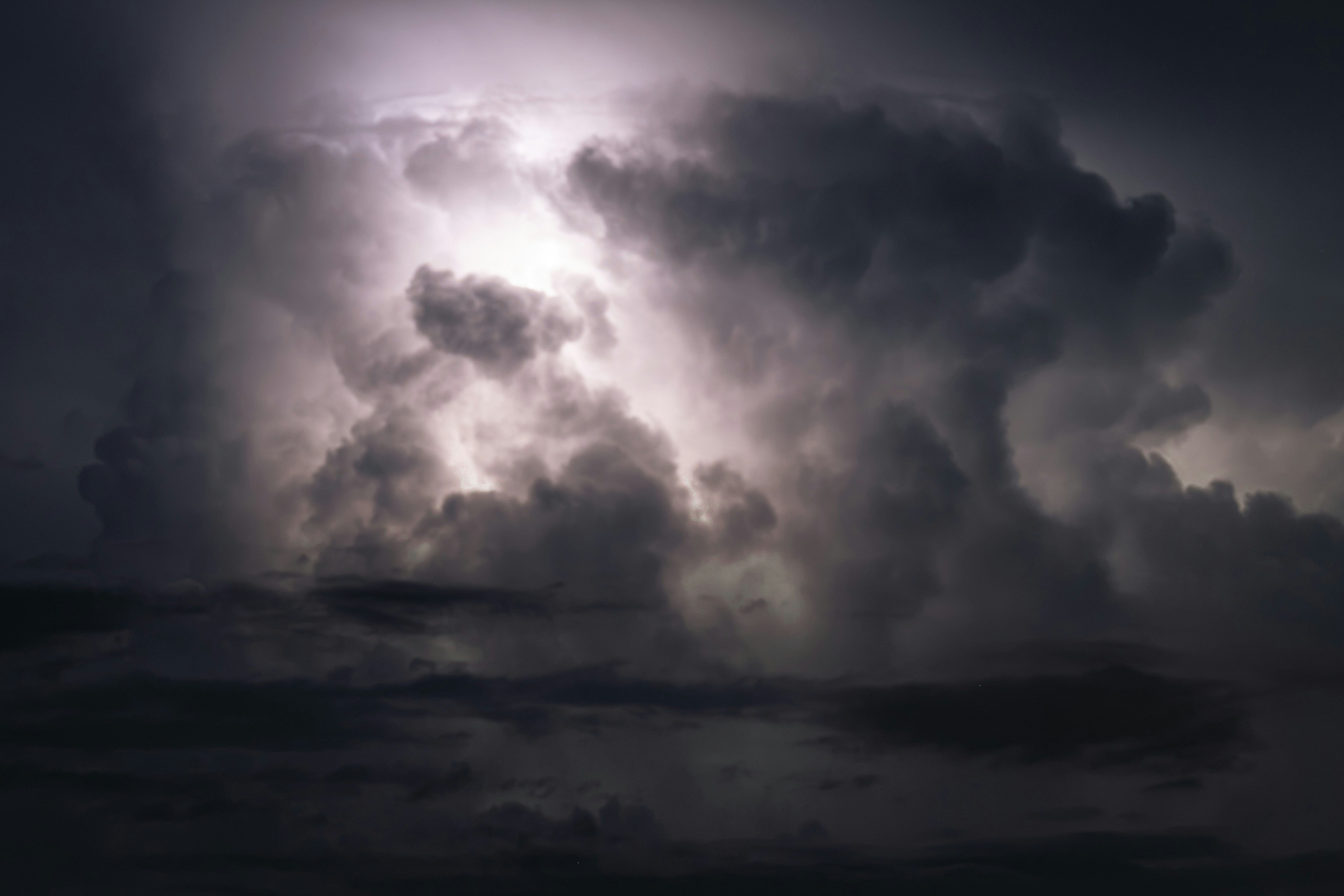 Lightning in the Void: An Enigmatic Sky Behind Dark Clouds