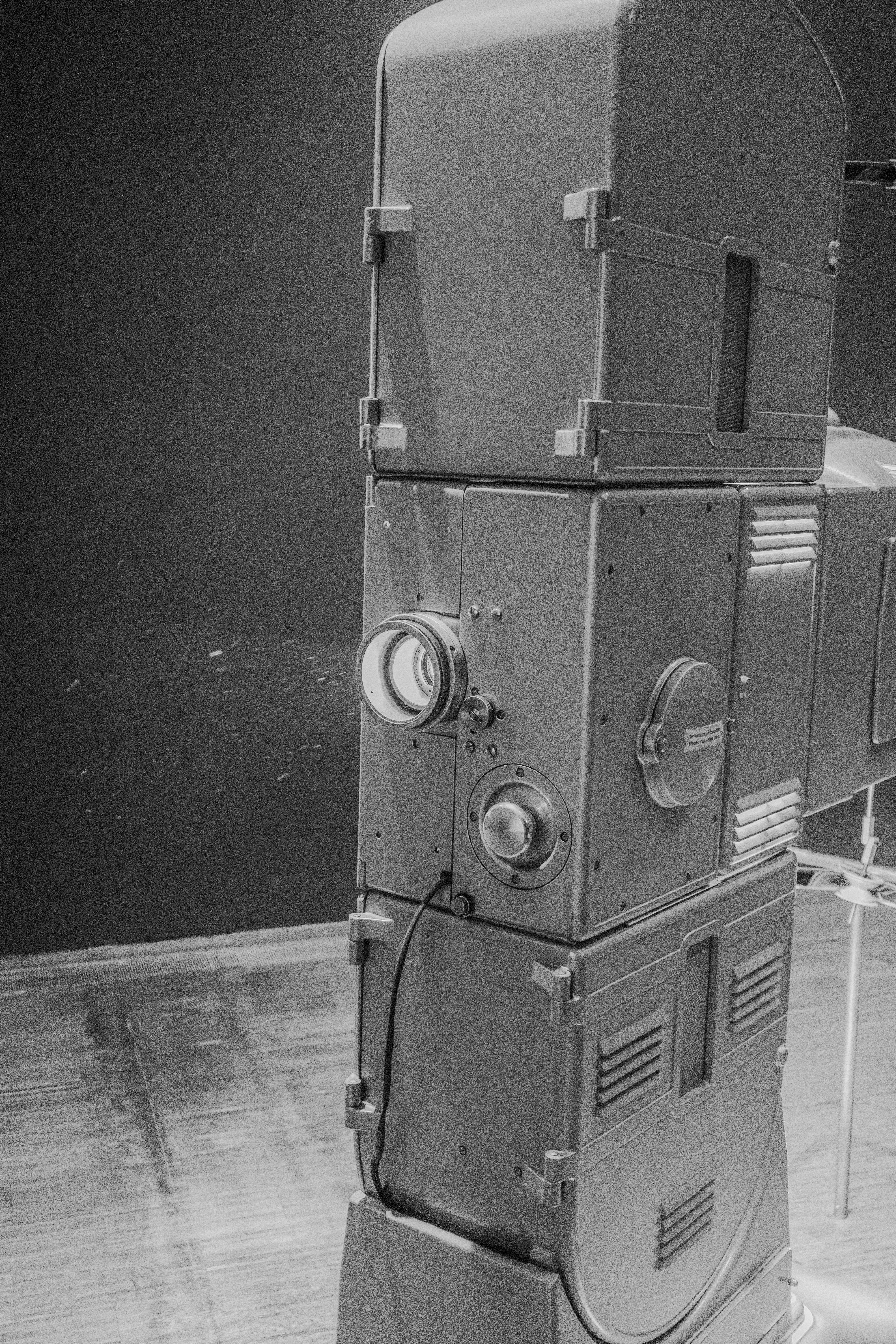 Industrial silhouette: a vintage projector tower in monochrome