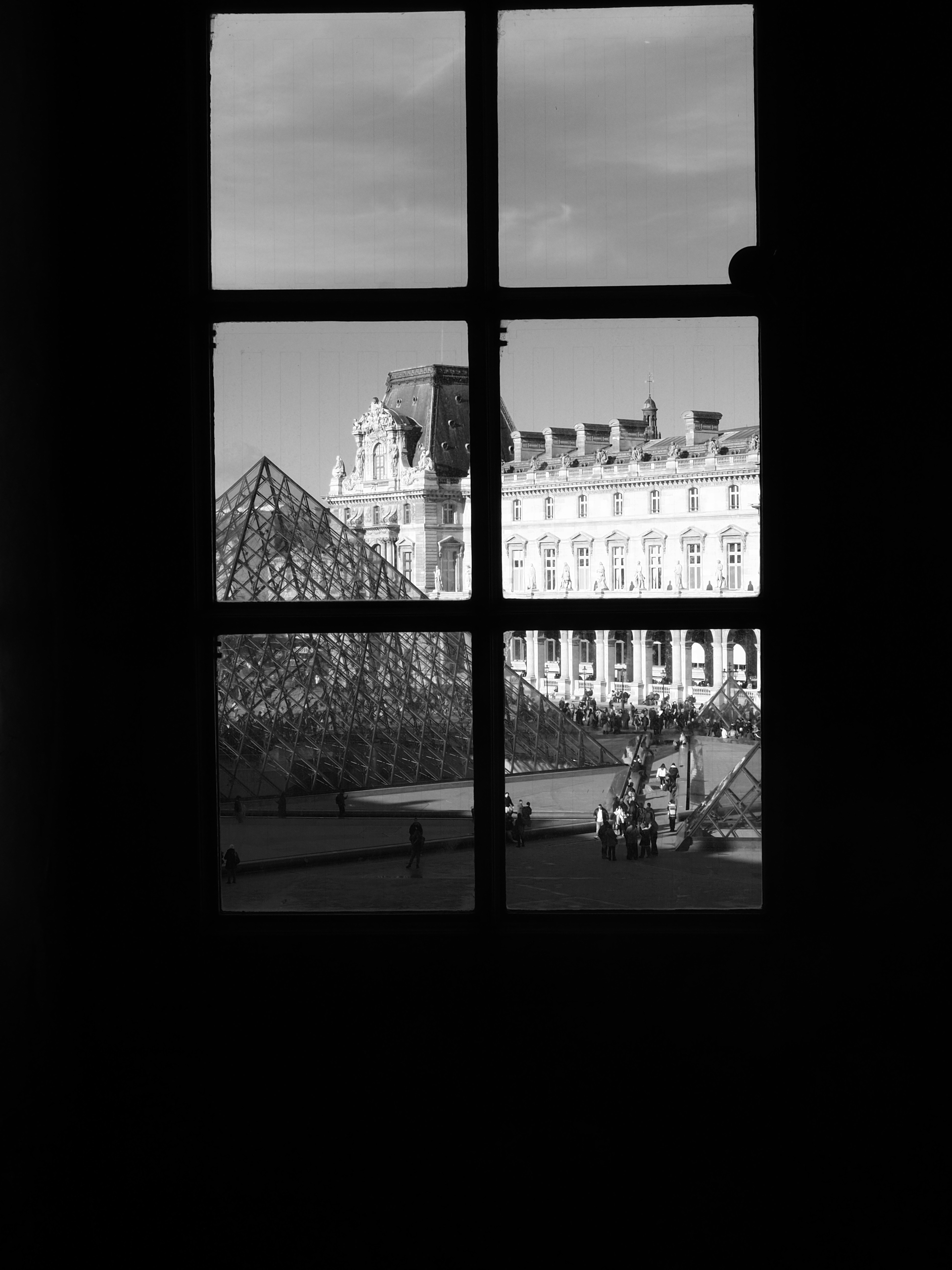 Through the Window to the Louvre: A Quiet Slice of Time