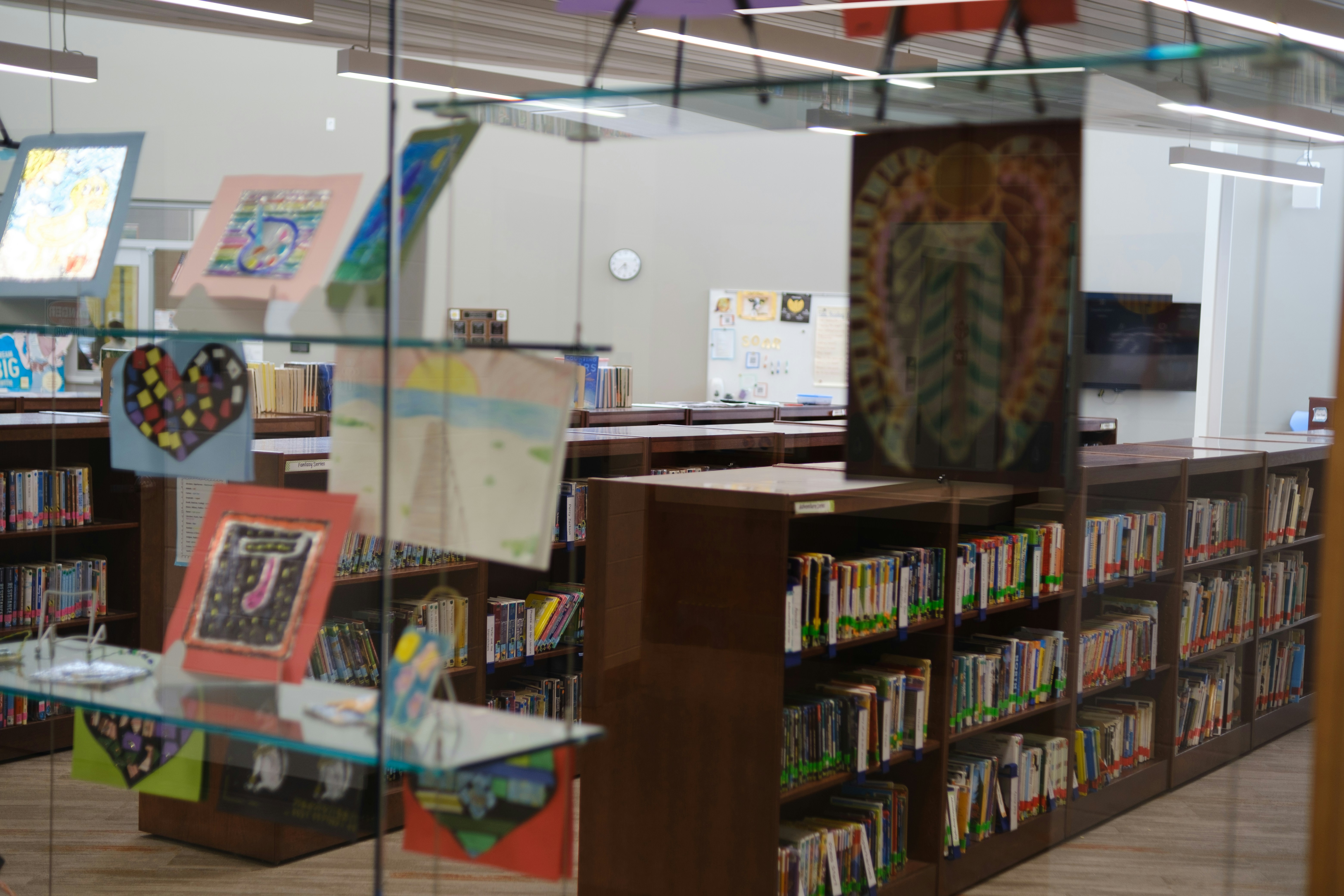 Glass walls, colorful student artwork: a quiet library with a view into creativity