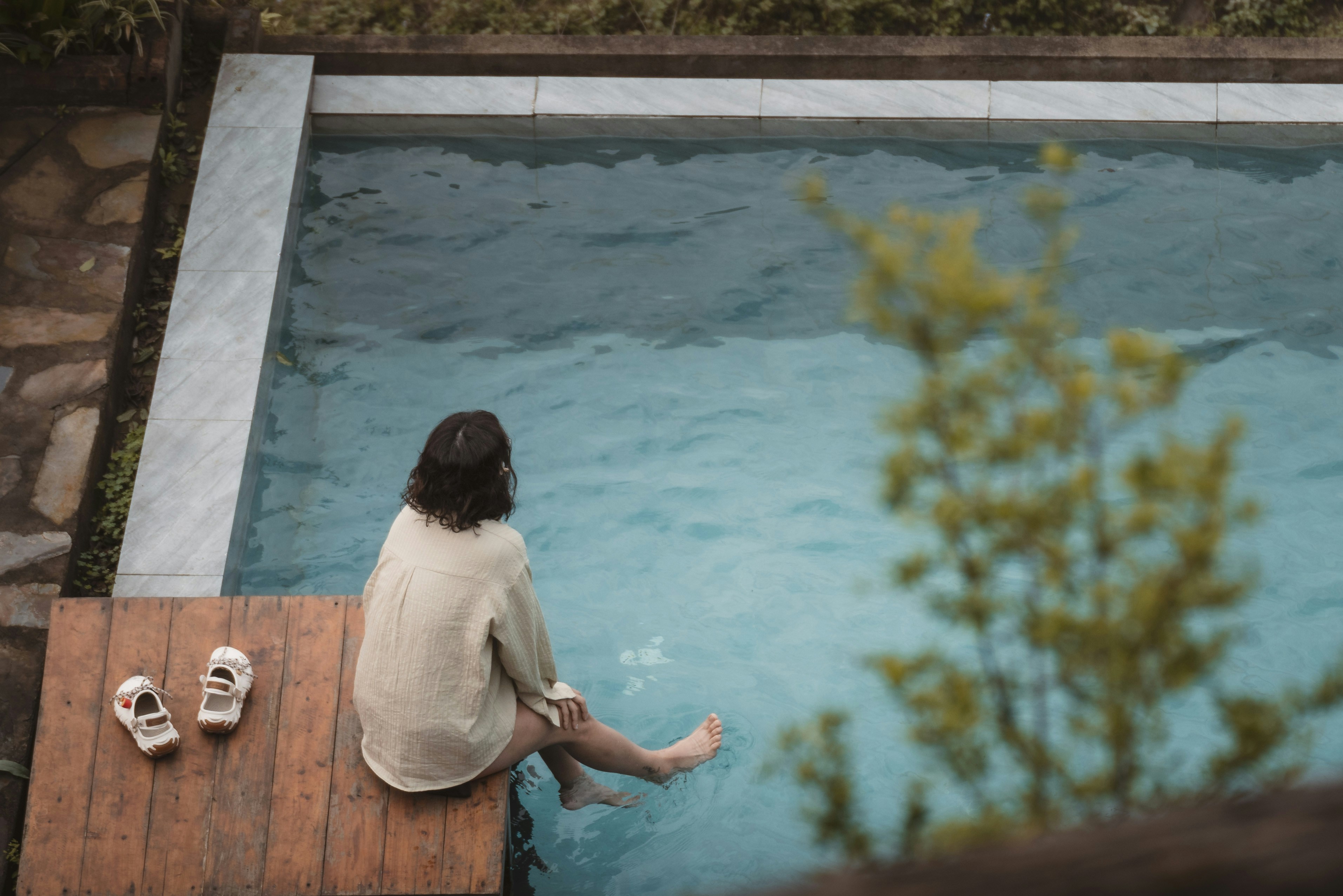 Ivy & Ripples: A Quiet Moment by the Pool