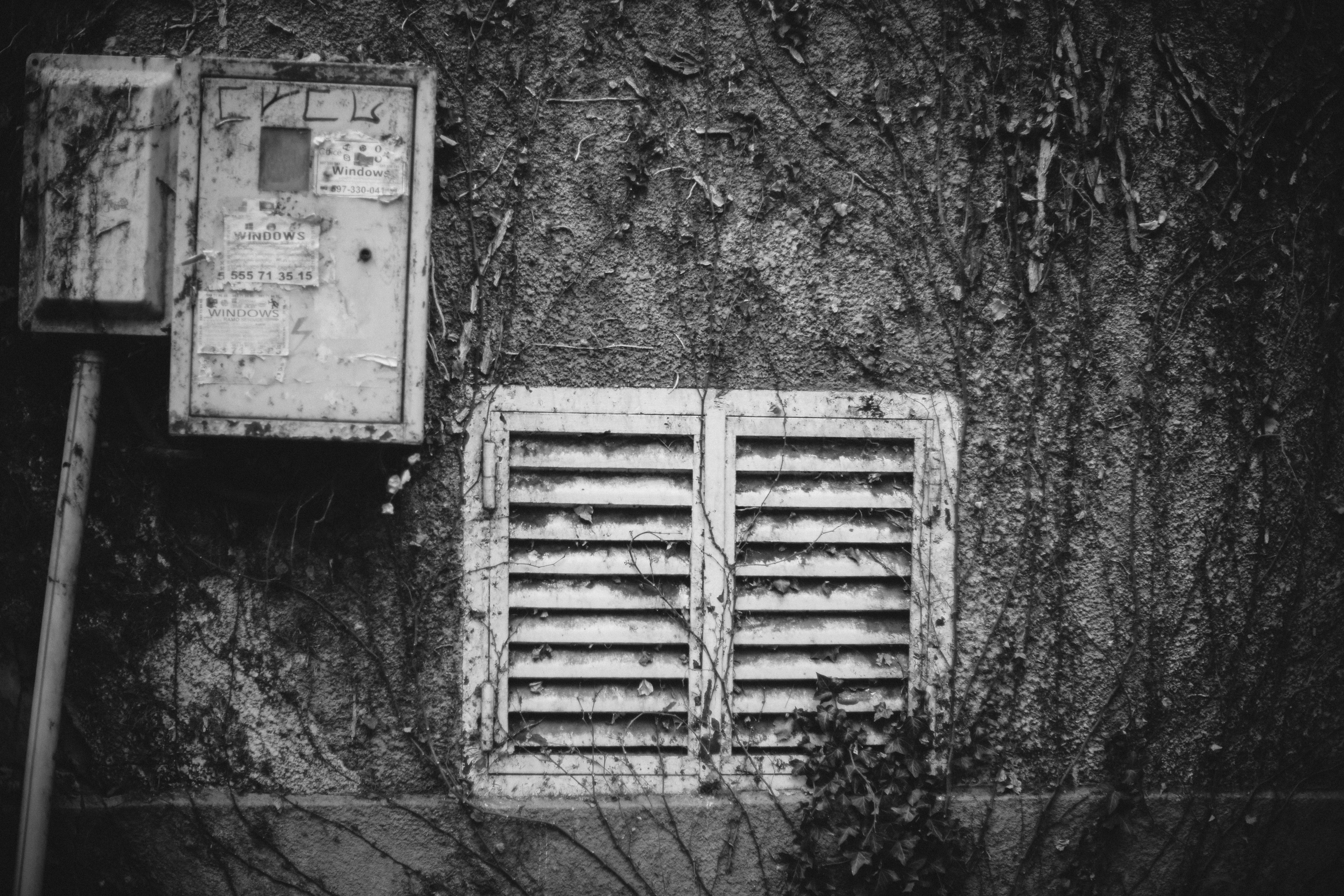 Weathered Vents in Dim Concrete Veil