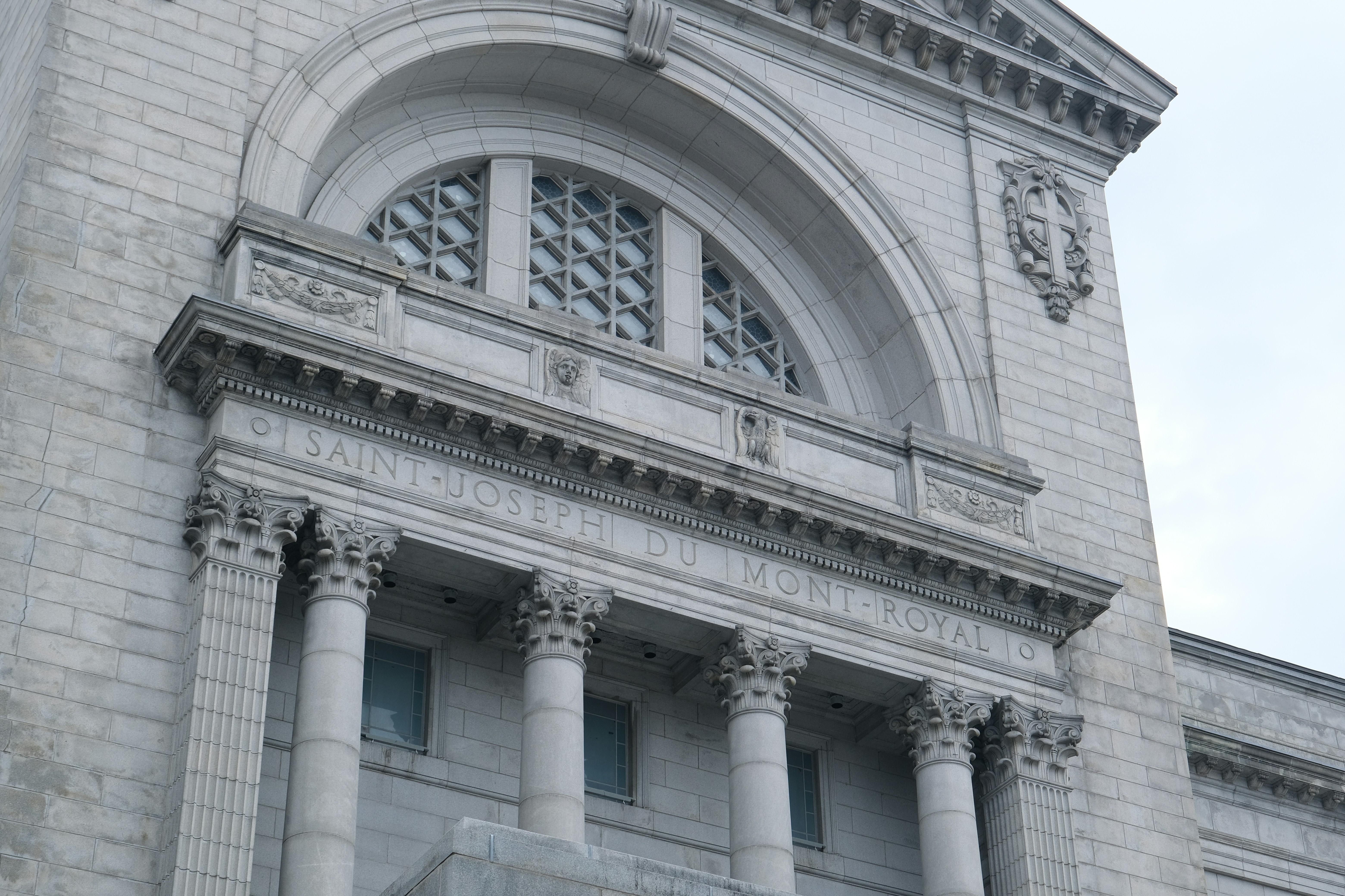 Stone Facade Chorus: Neoclassical Arch and Columns of Saint-Joseph du Mont-Royal