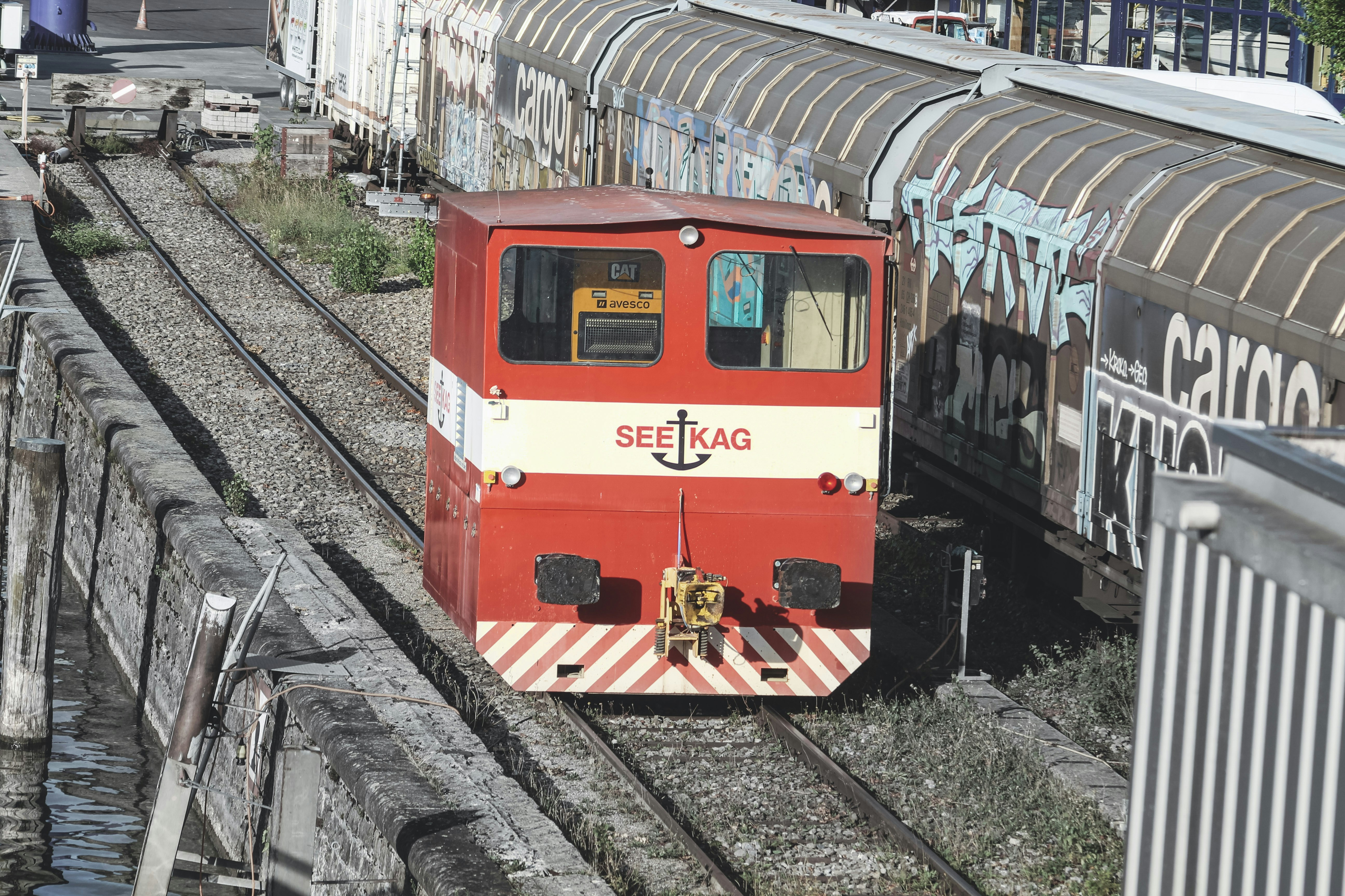 Red KAG Shuttle Waiting on Urban Tracks