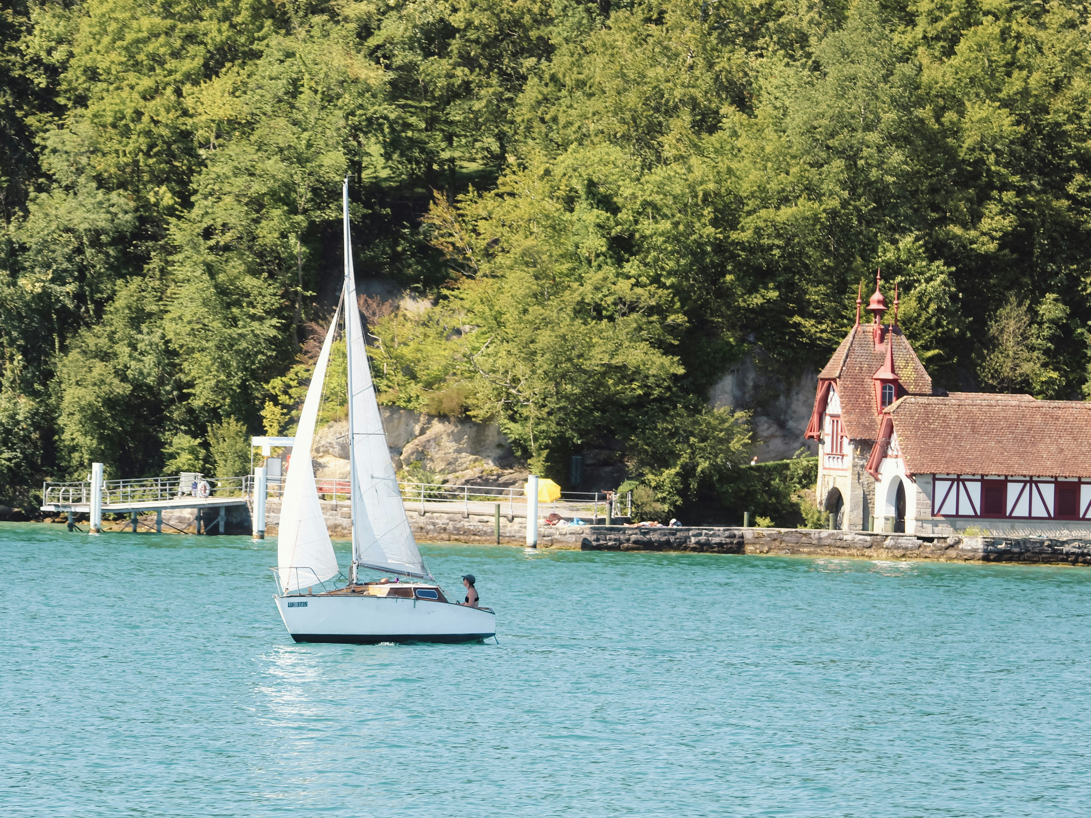 Sailboat Serenade on Turquoise Waters