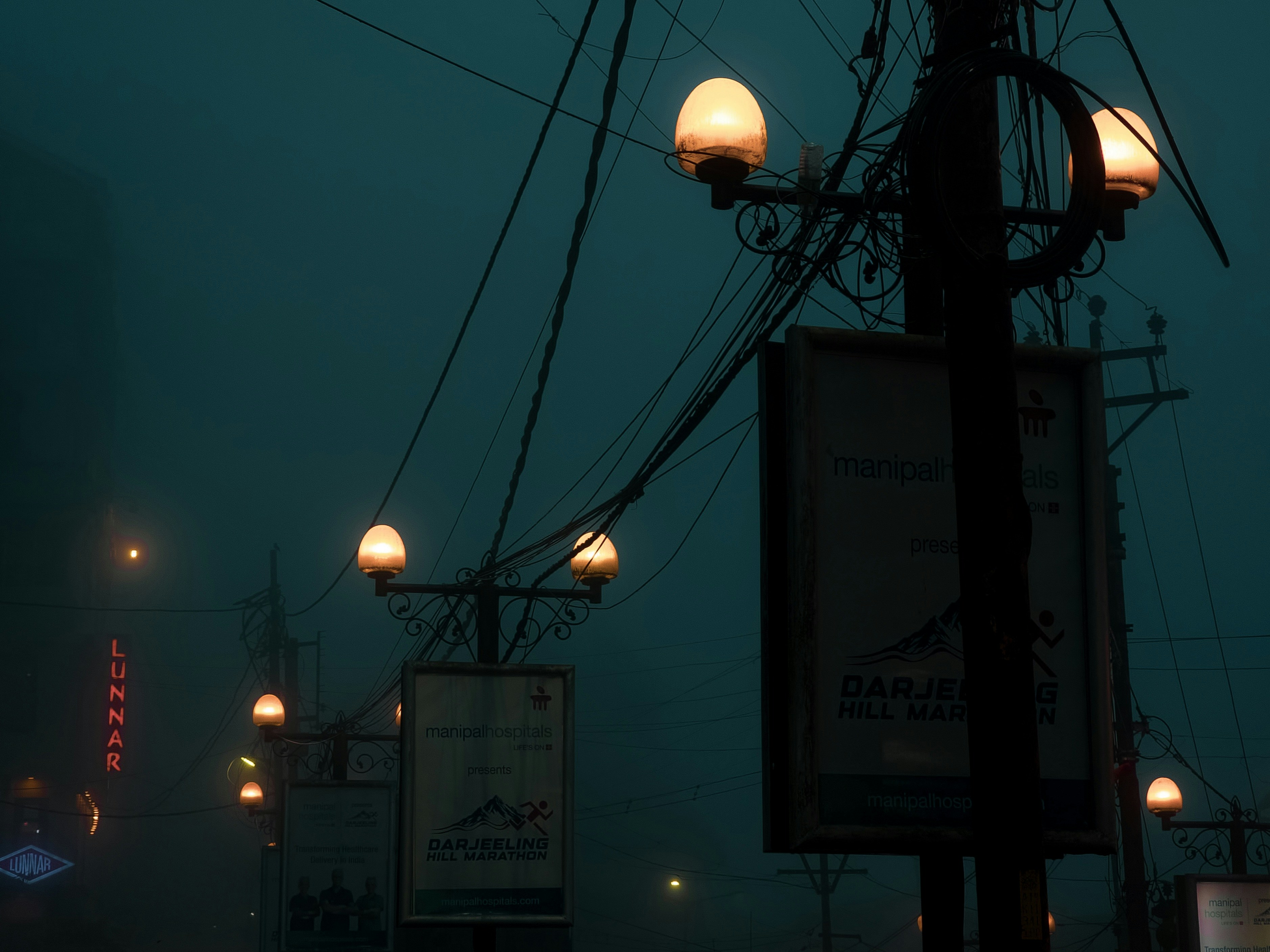 Fogged Neon Alleys: Power Lines and Lamp Posts in Blue Hour