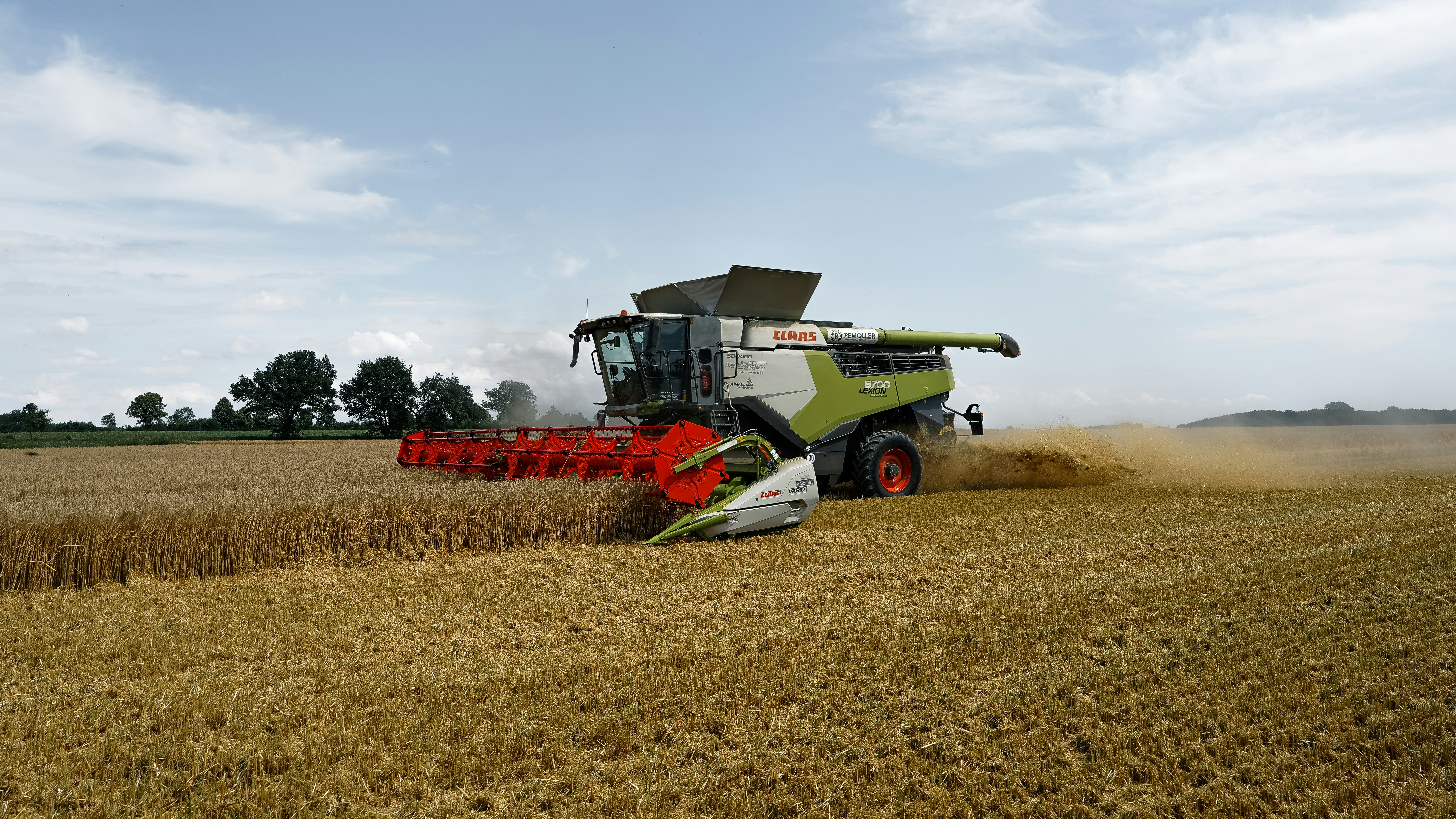 Harvest Racer: A Grain Harvester Spears Across a Golden Field