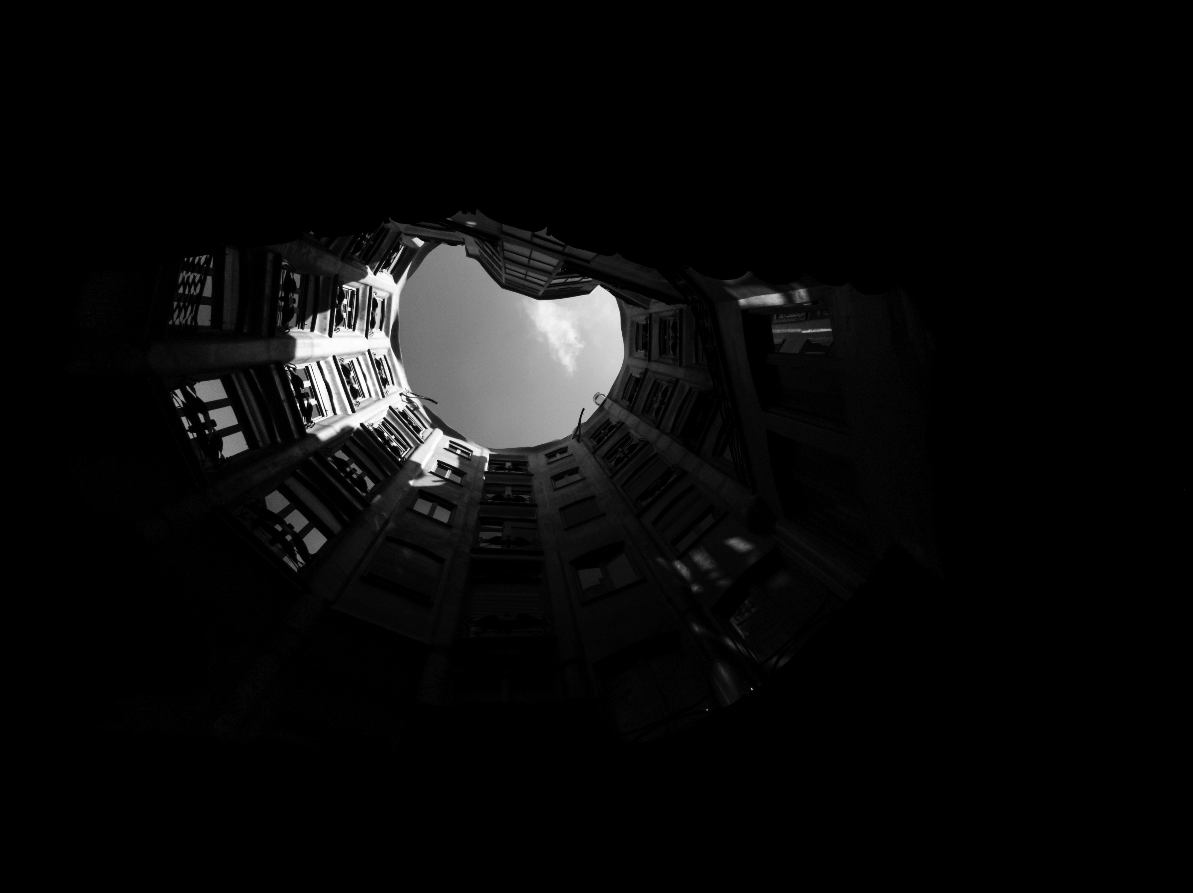 Circular Atrium Skyward: A Darkened Perspective into the Void