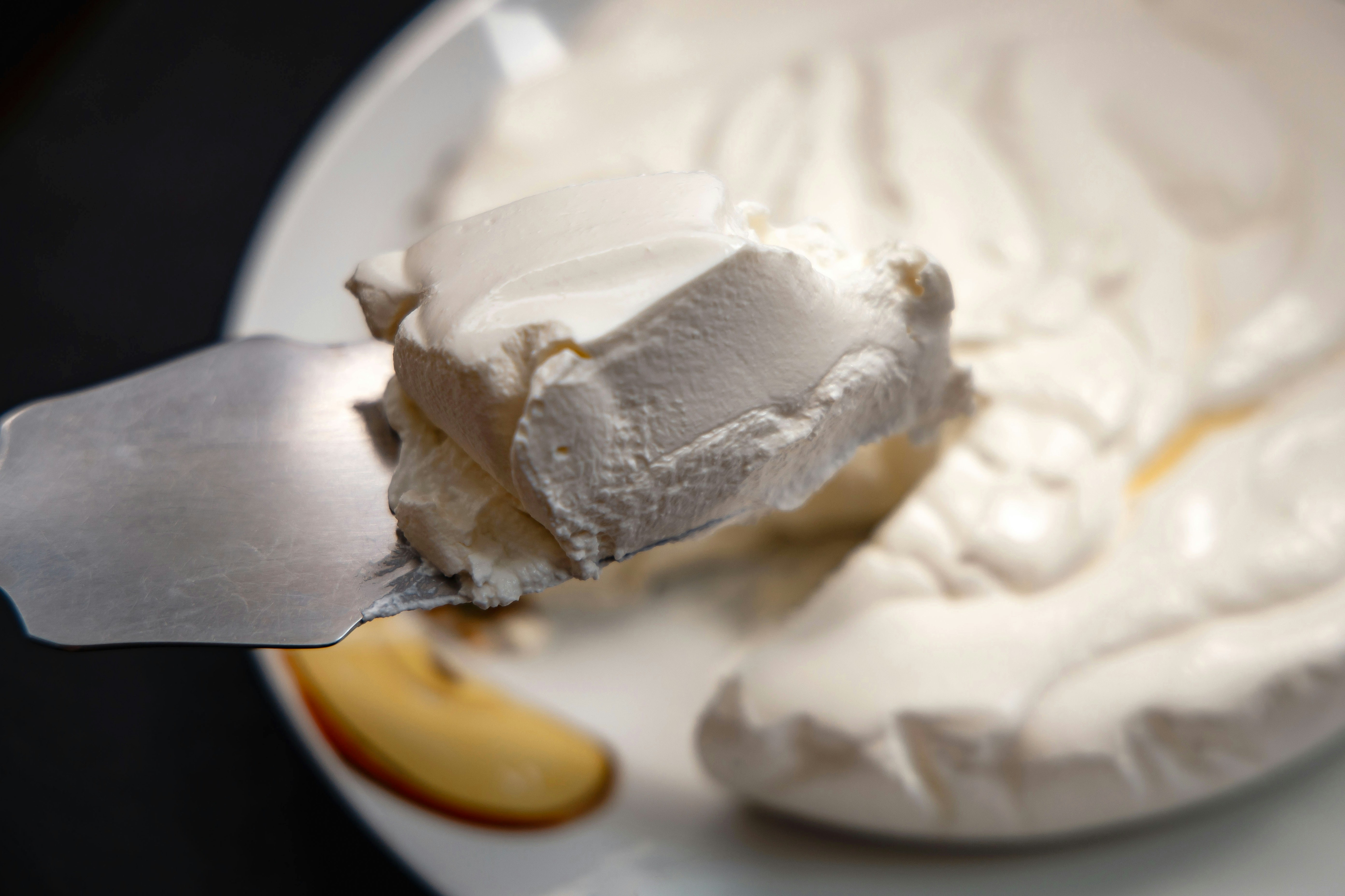 Silky Peak of Whipped Cream: A Slice of Dessert Creaminess
