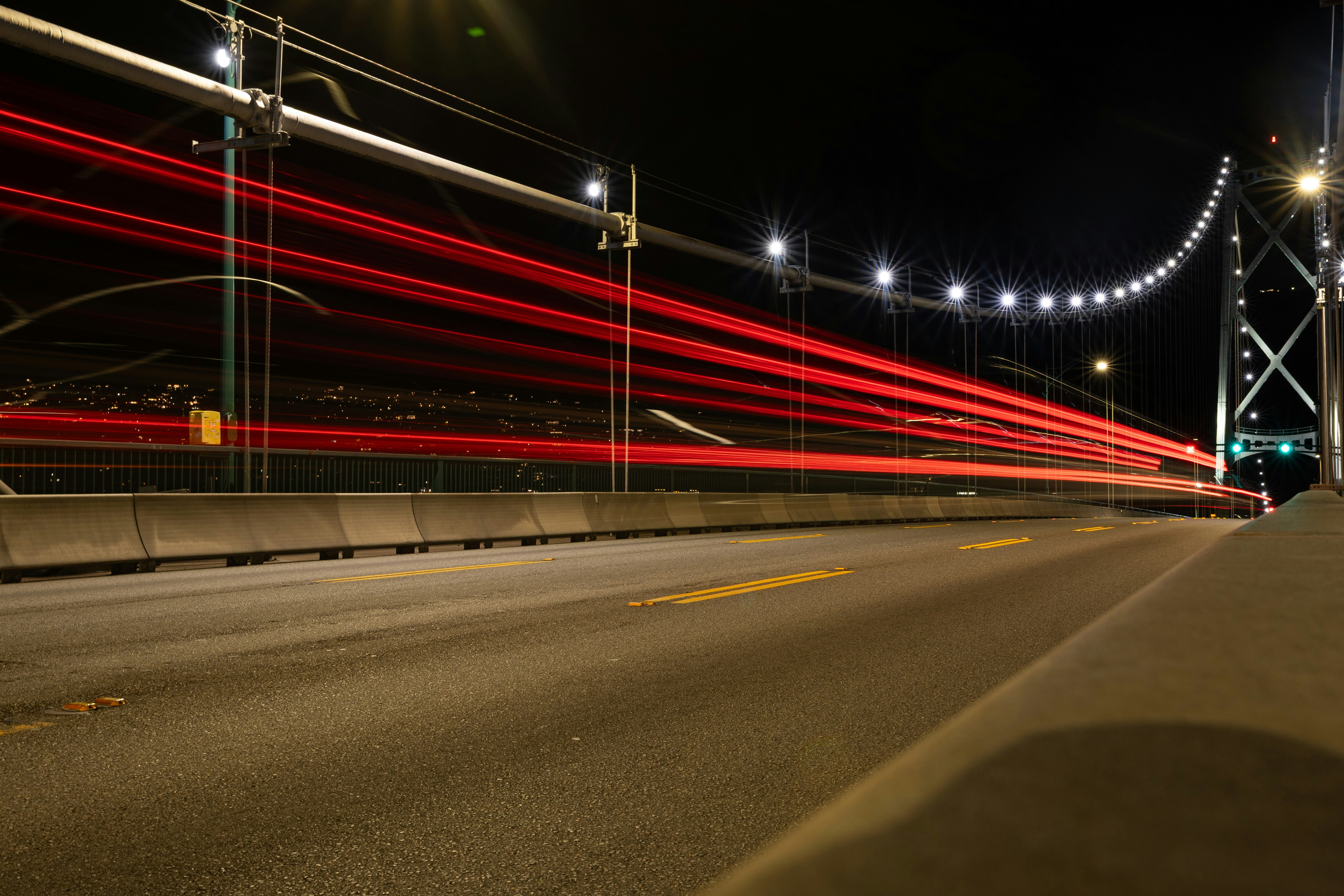 Red Streaks Over a Night Bridge
