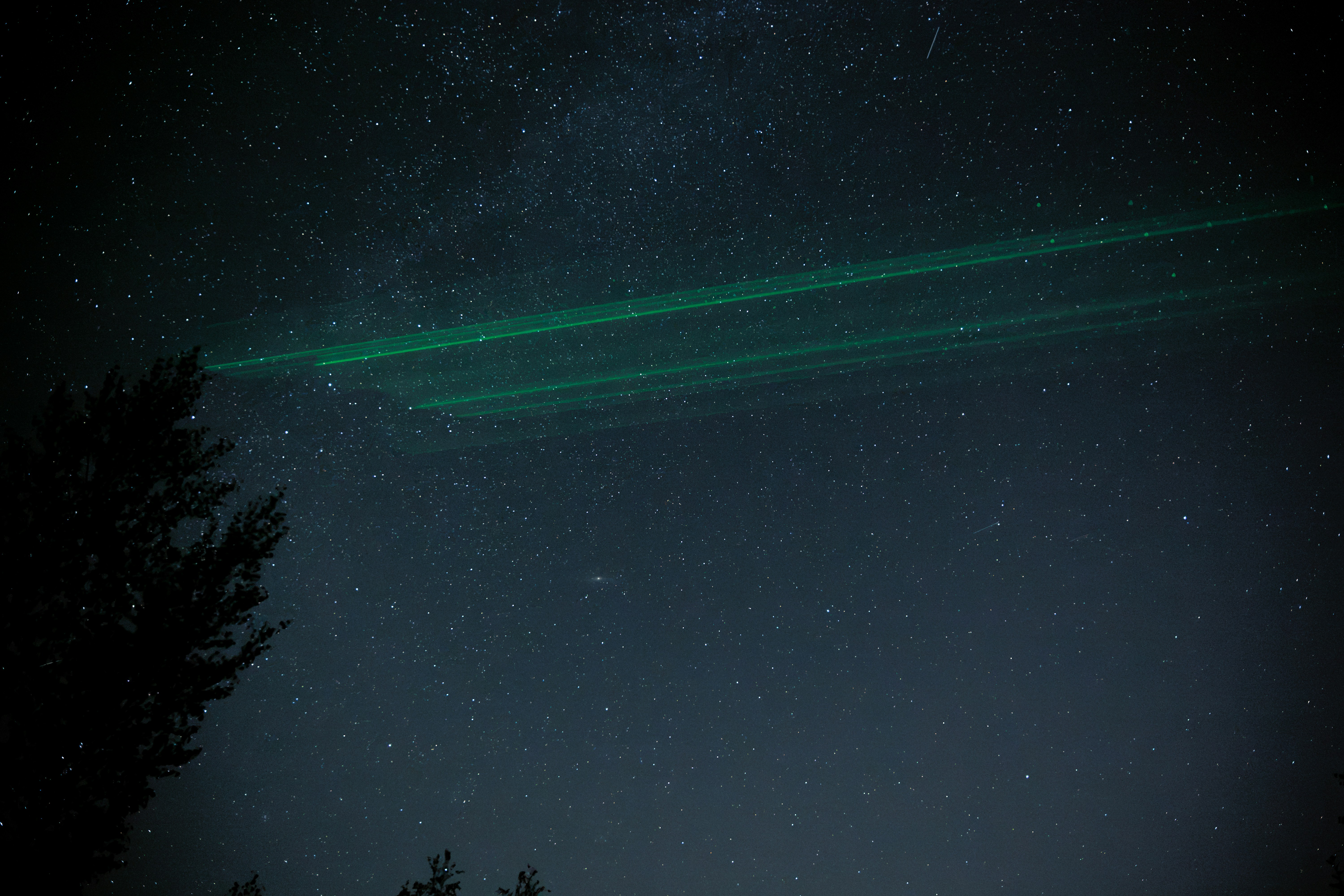 Emerald Trail Across the Night Sky