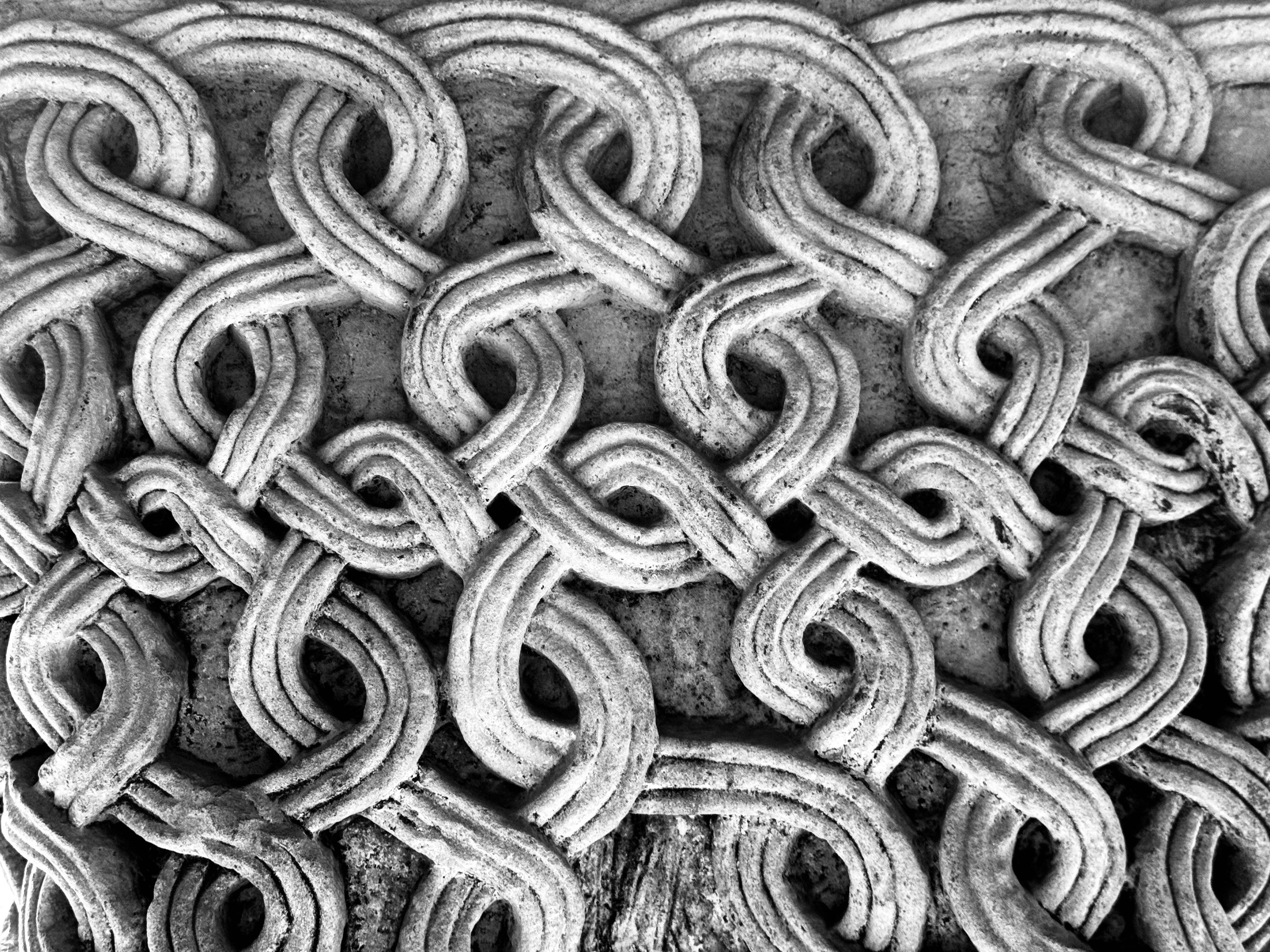 Interwoven Chains: A Monochrome Mosaic of Linked Loops