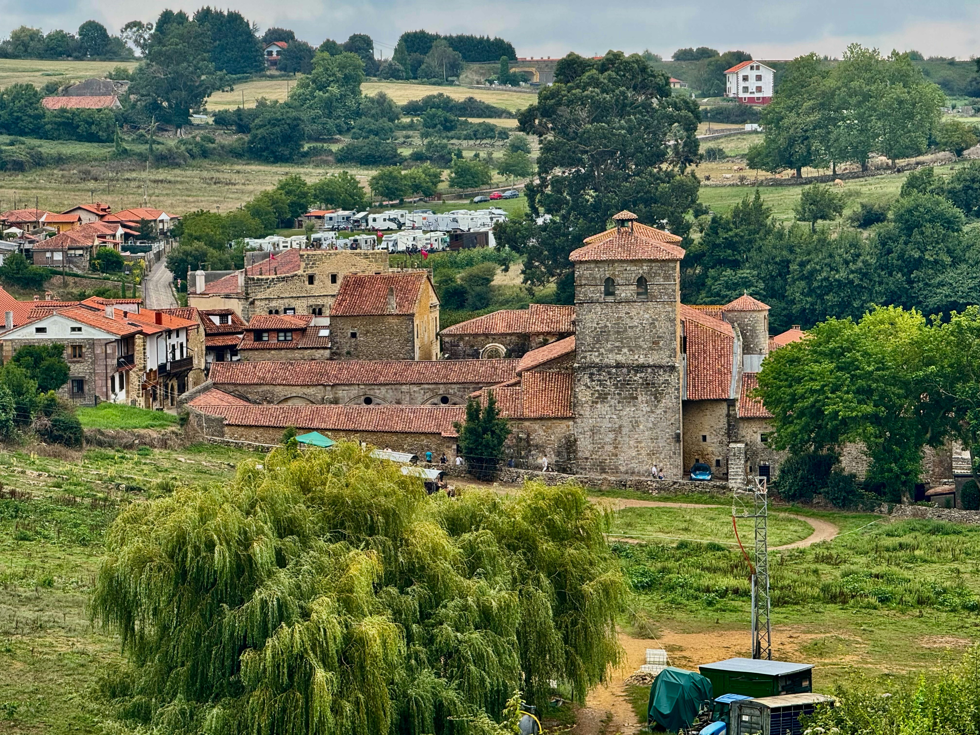 Stone Village Keep Surrounded by Rolling Green Fields