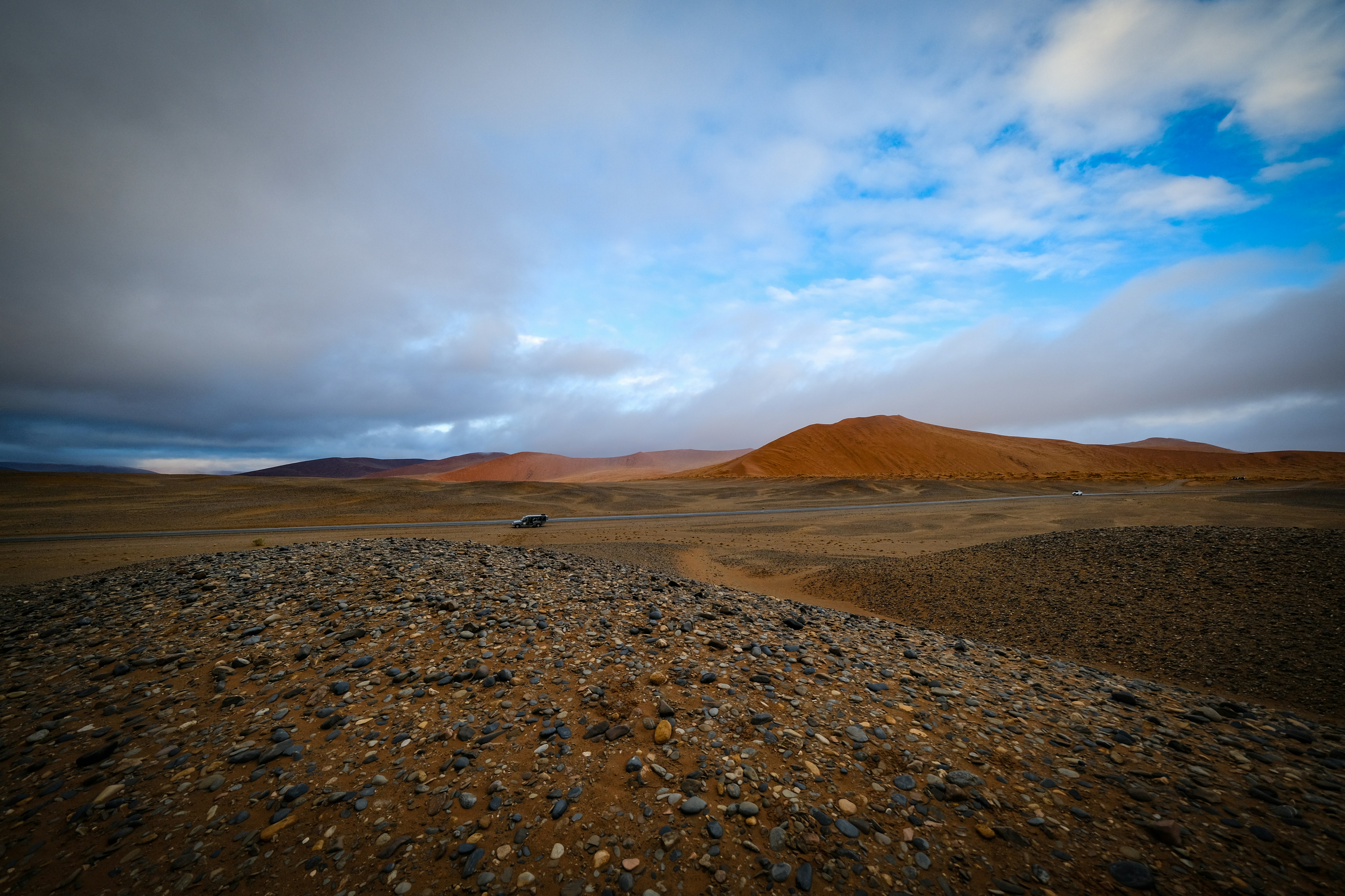 Distant Dune Horizon under Quiet Skies