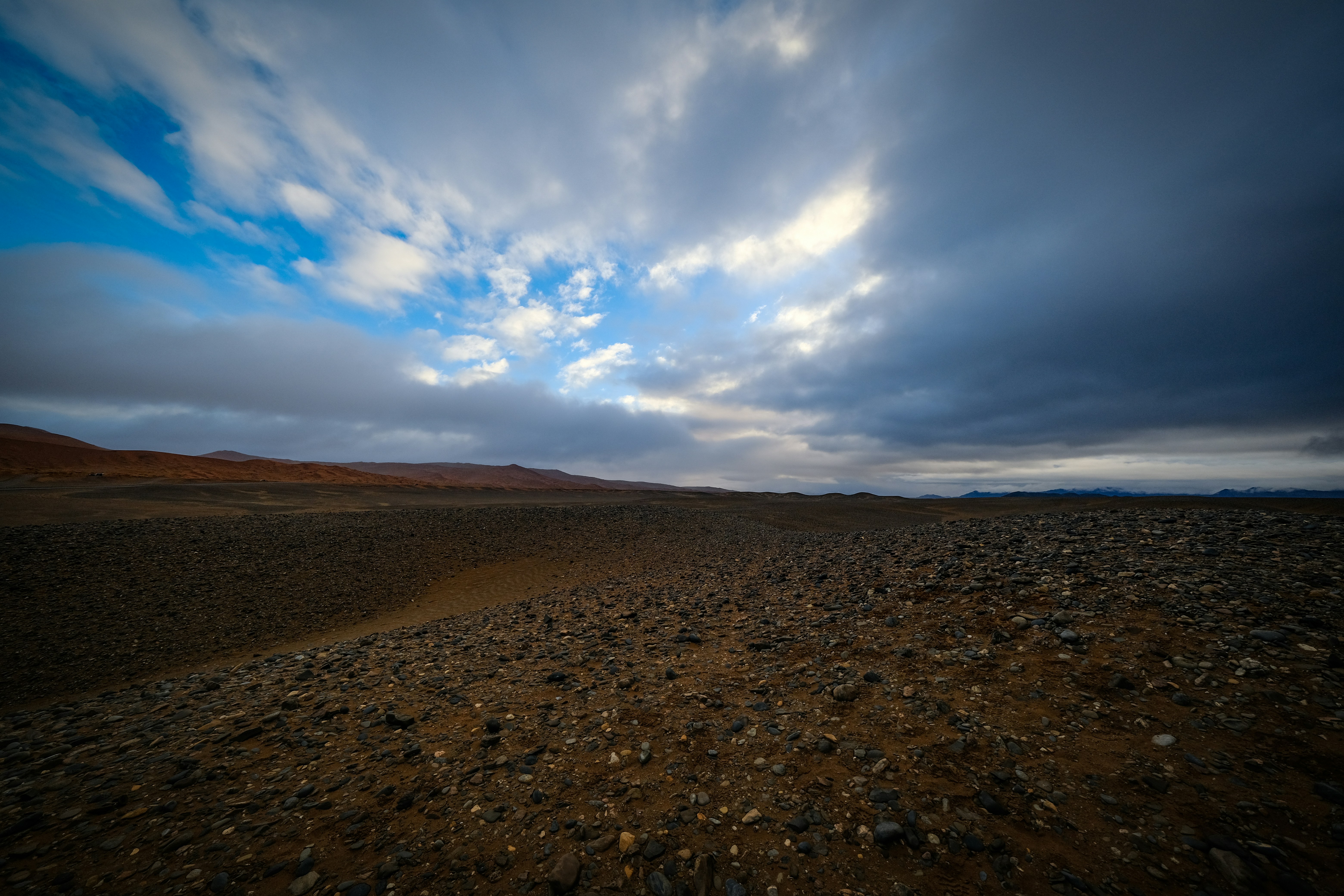 Desert Rim Under a Brooding Sky