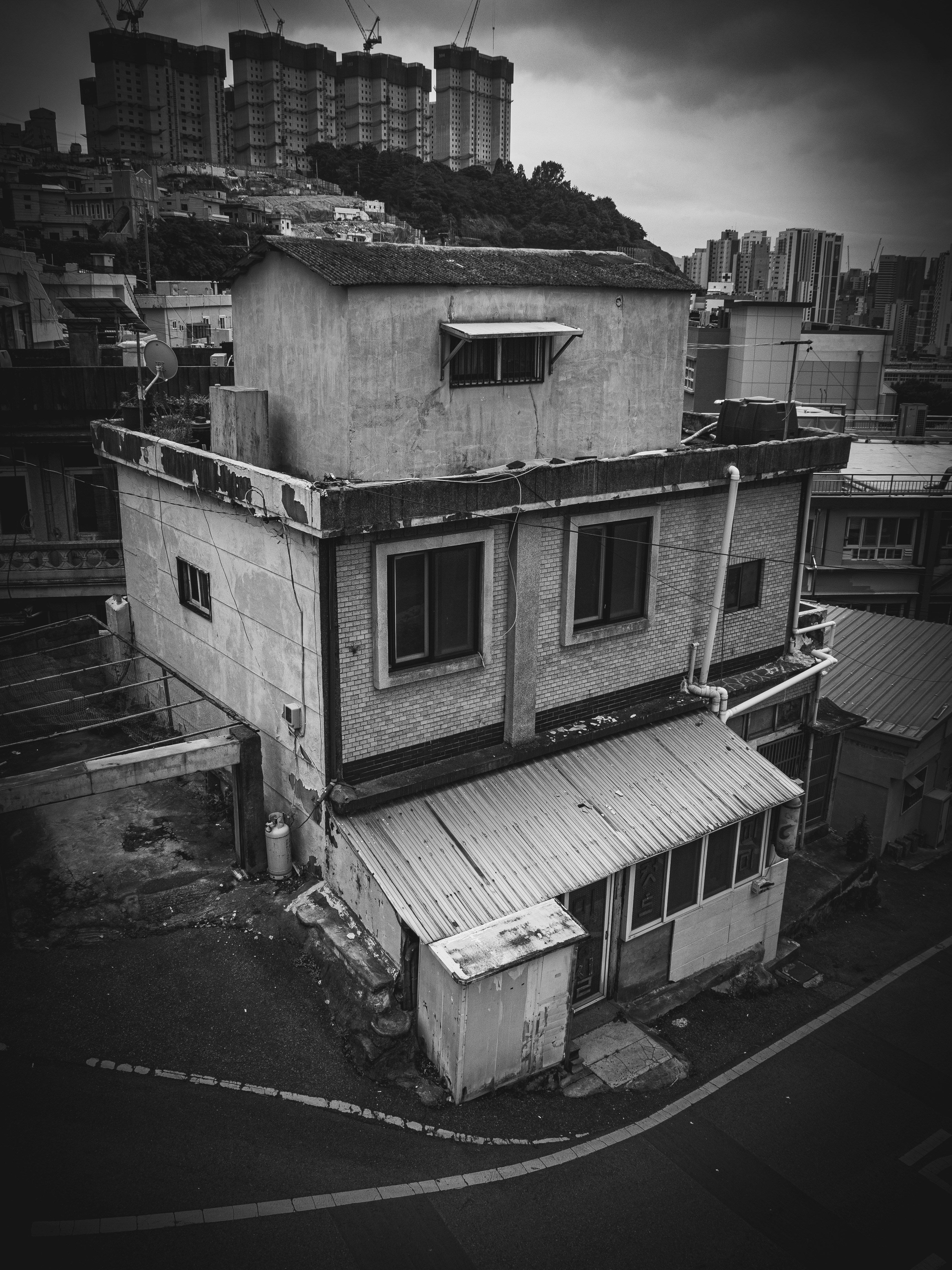 Weathered rooftop in monochrome: a quiet urban corner