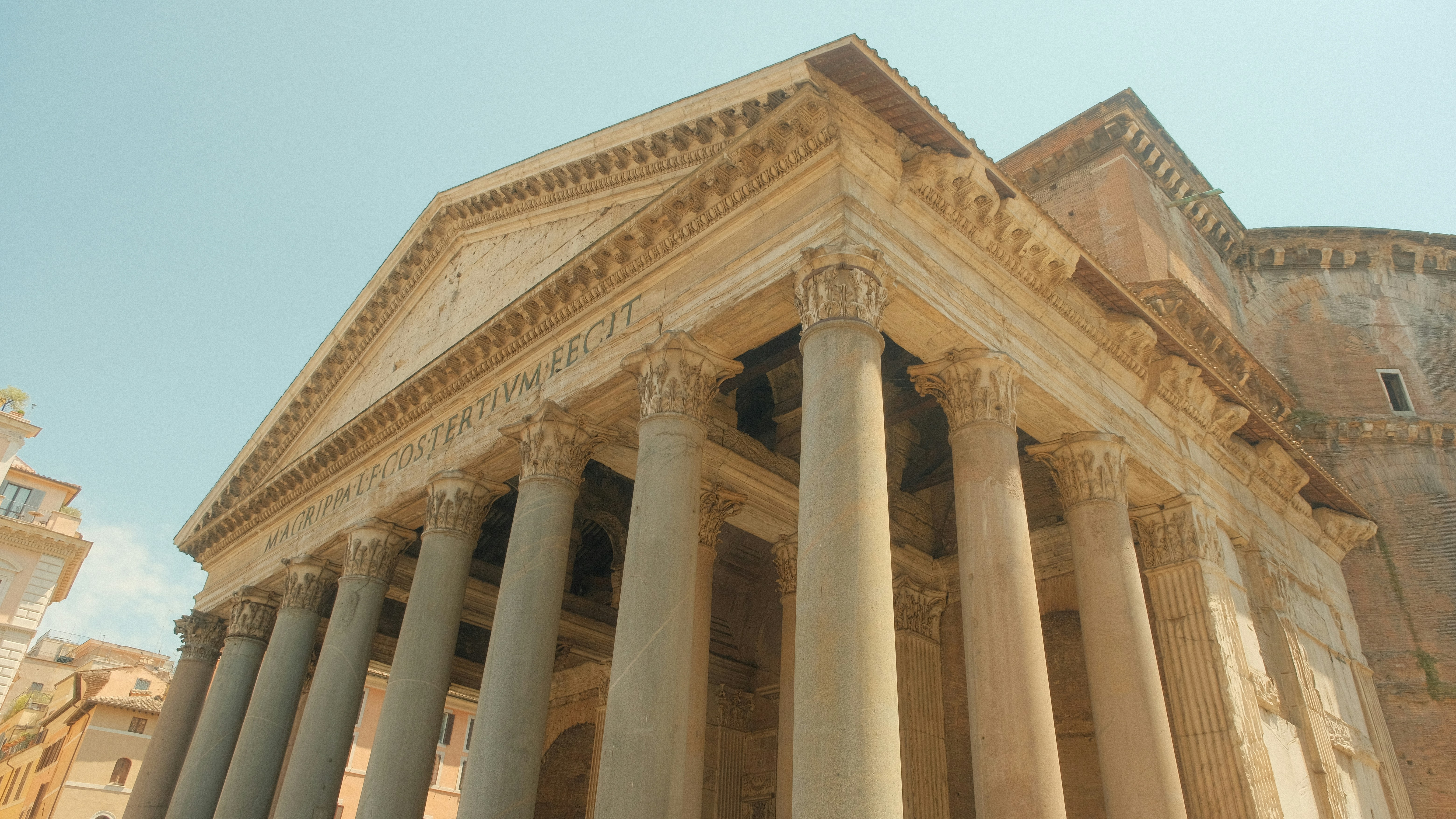 Stone Folly: A Temple’s Colonnade Reaching Toward Clear Skies