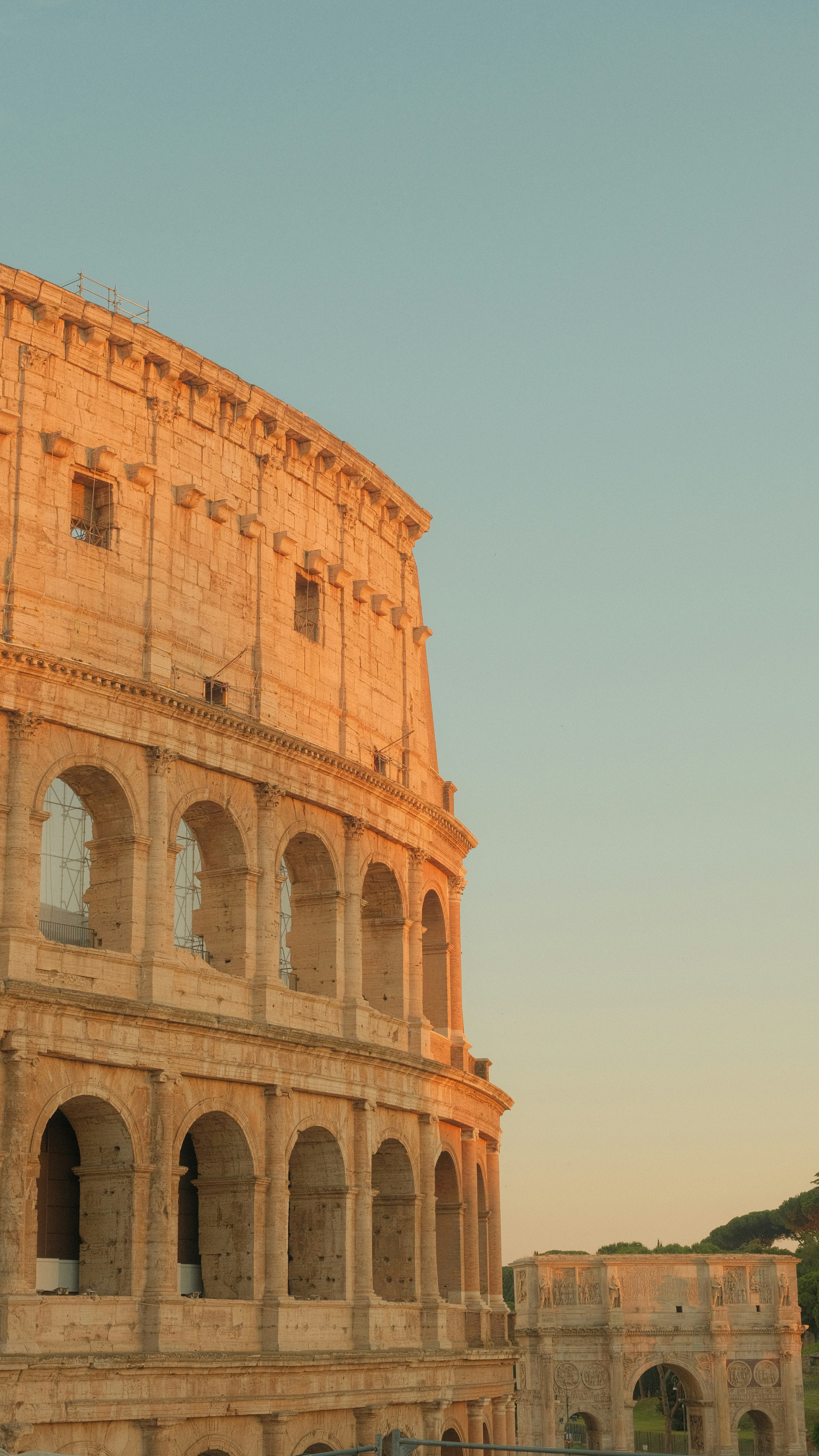 Golden Hour at the Colosseum: Stone Arches in Warm Light