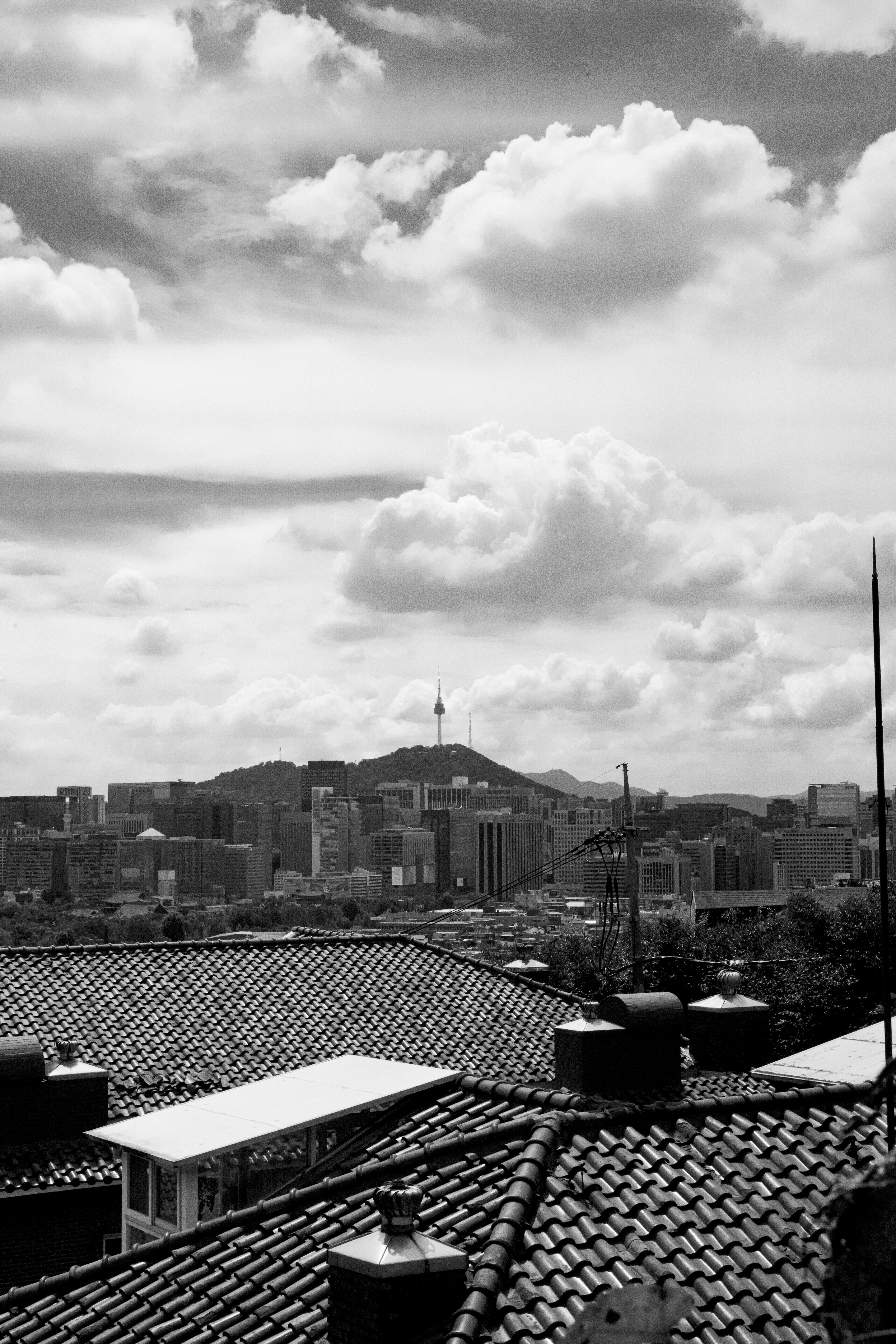 Urban Skyline Beneath Clouded Skies