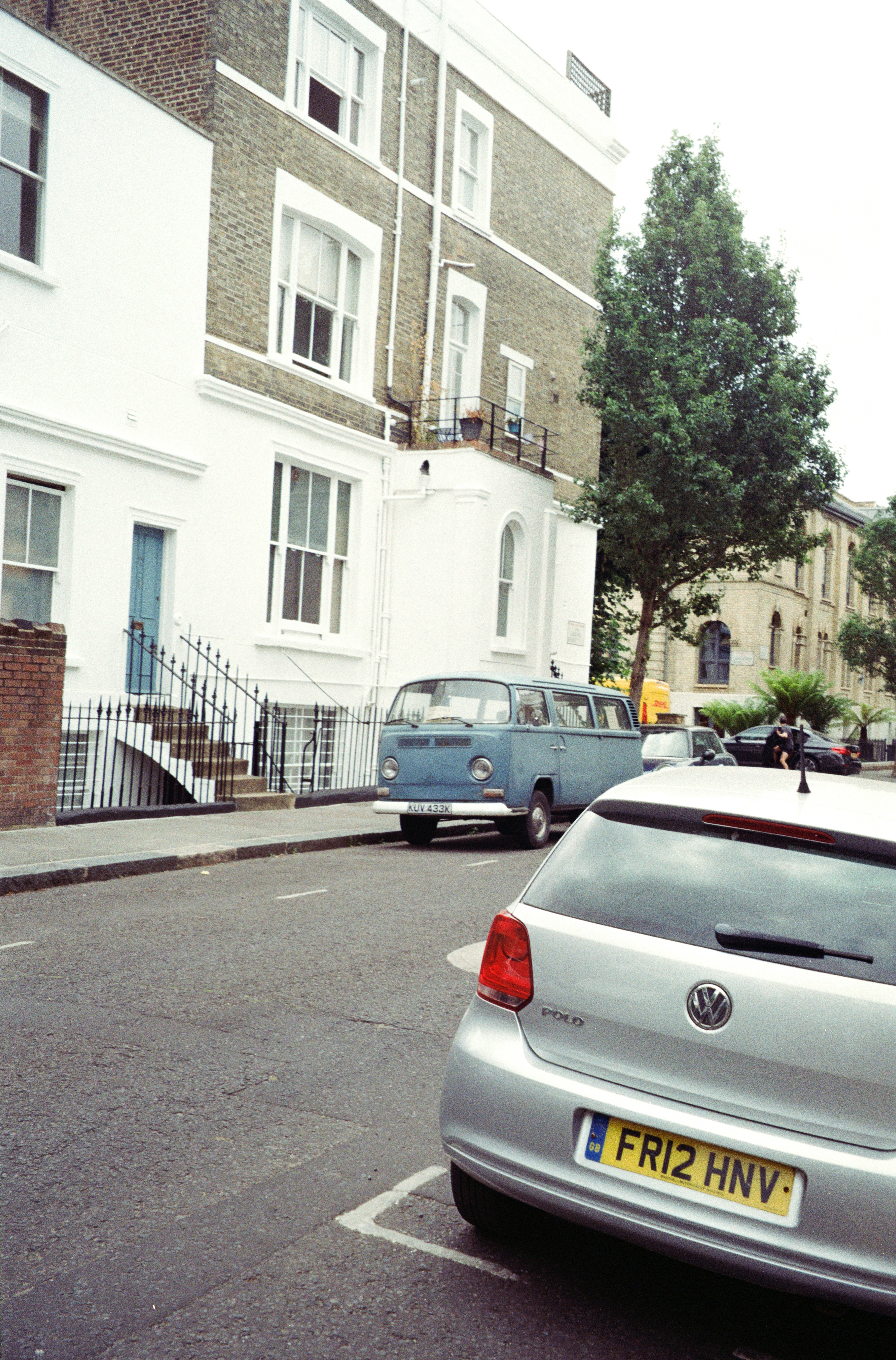 London Street Scene: A Quiet Blend of Vintage Van and Modern Car