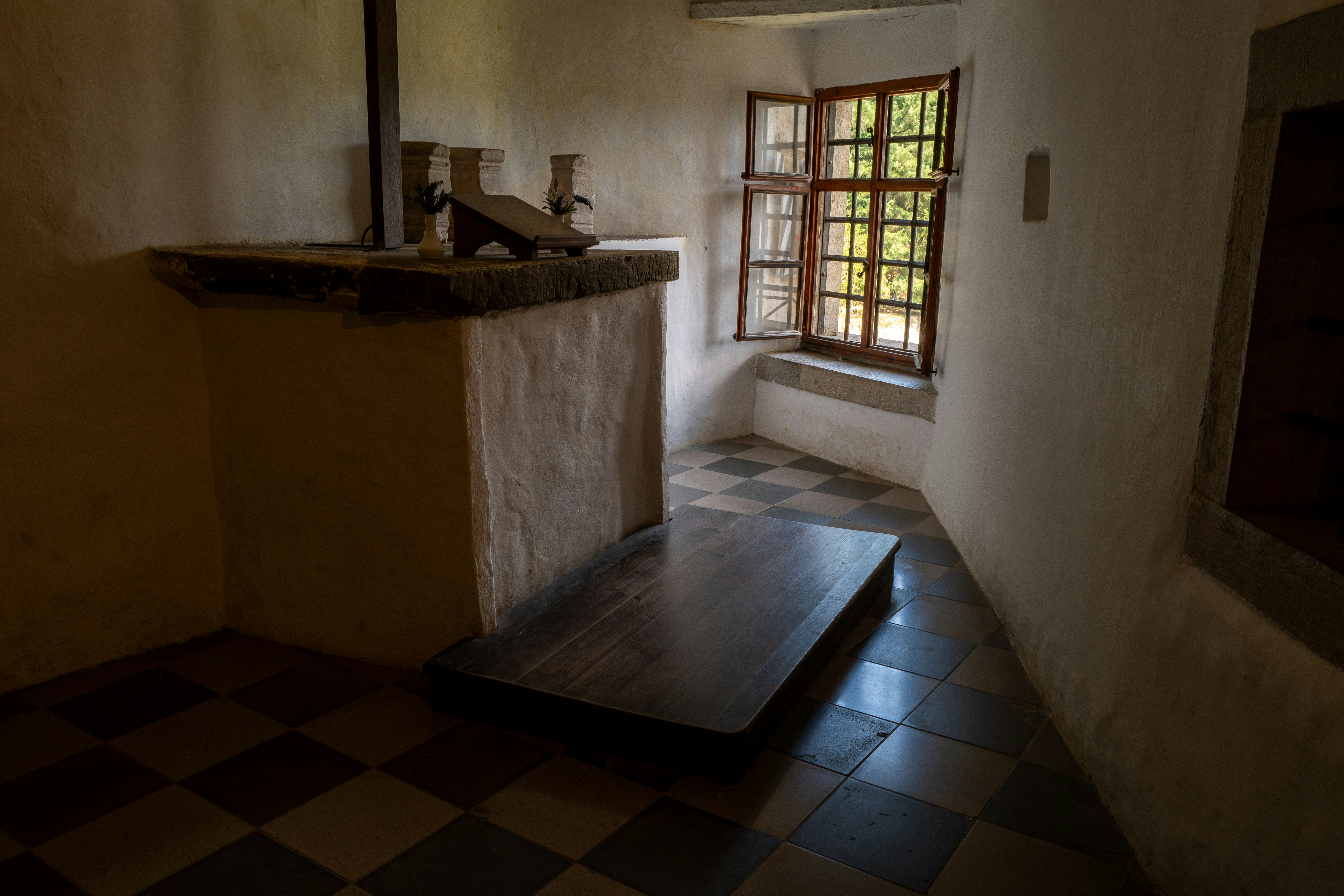 Sunlit Window, Dark Kitchen Nook: An Abandoned Room’s Quiet Shadowplay