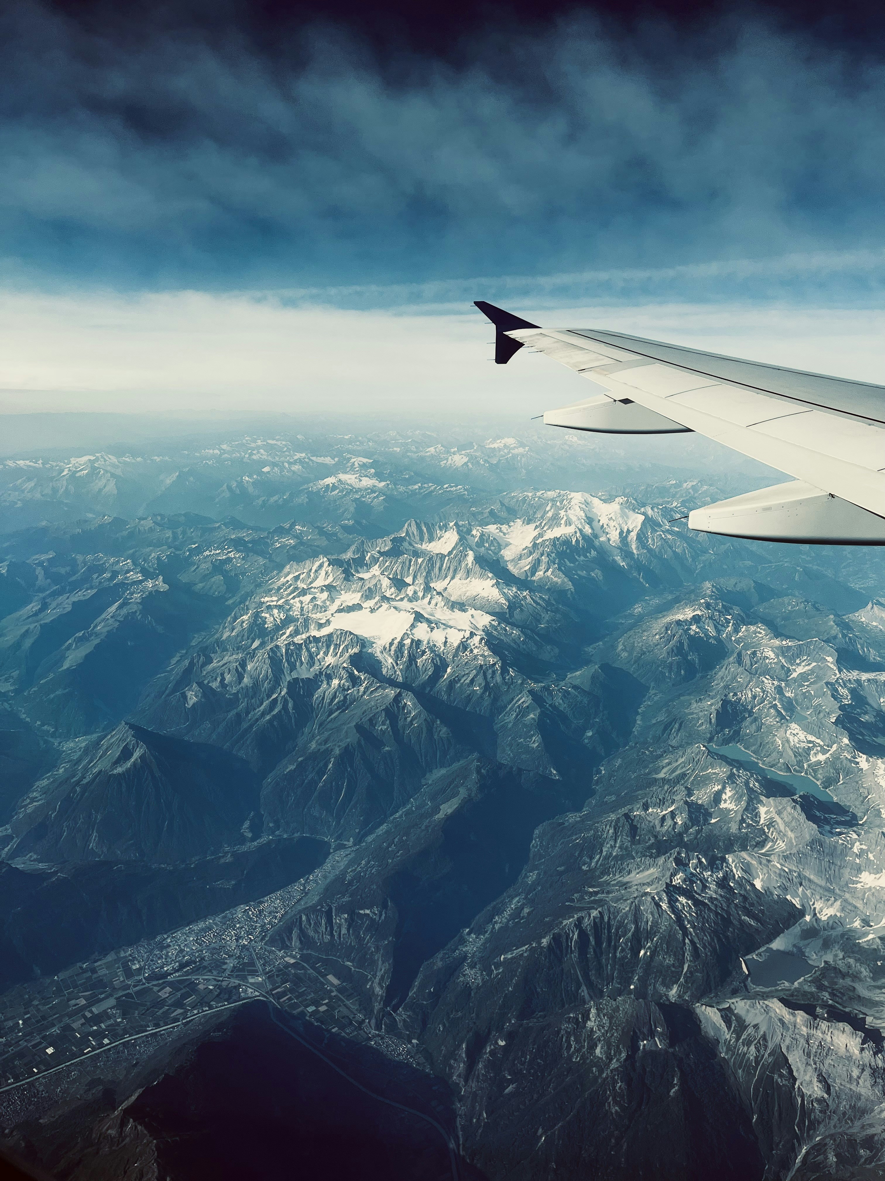 Wing over the Alpenglow: Aerial panorama of snow-crowned peaks