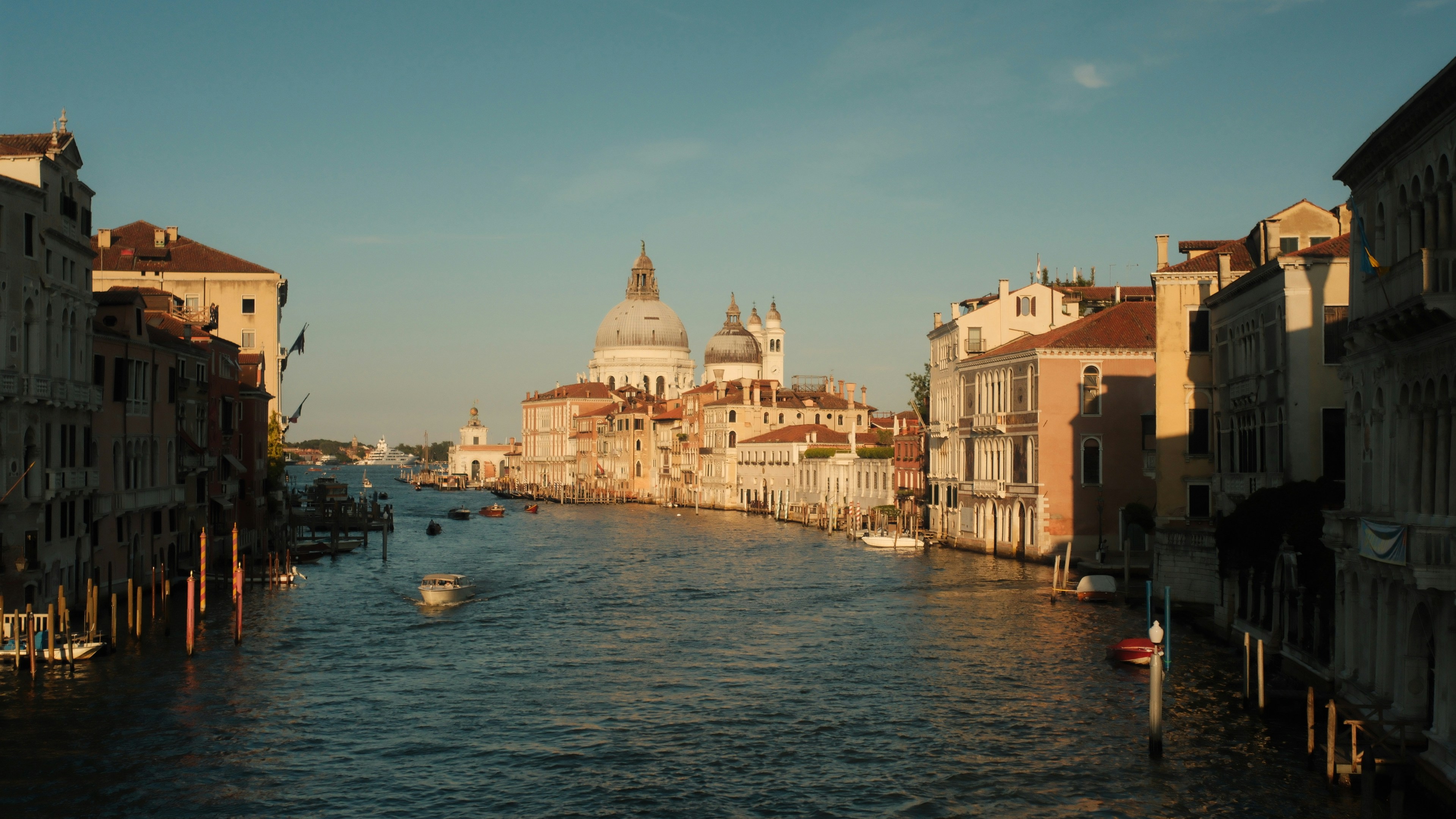 Domed skyline over the Venetian canal at golden hour