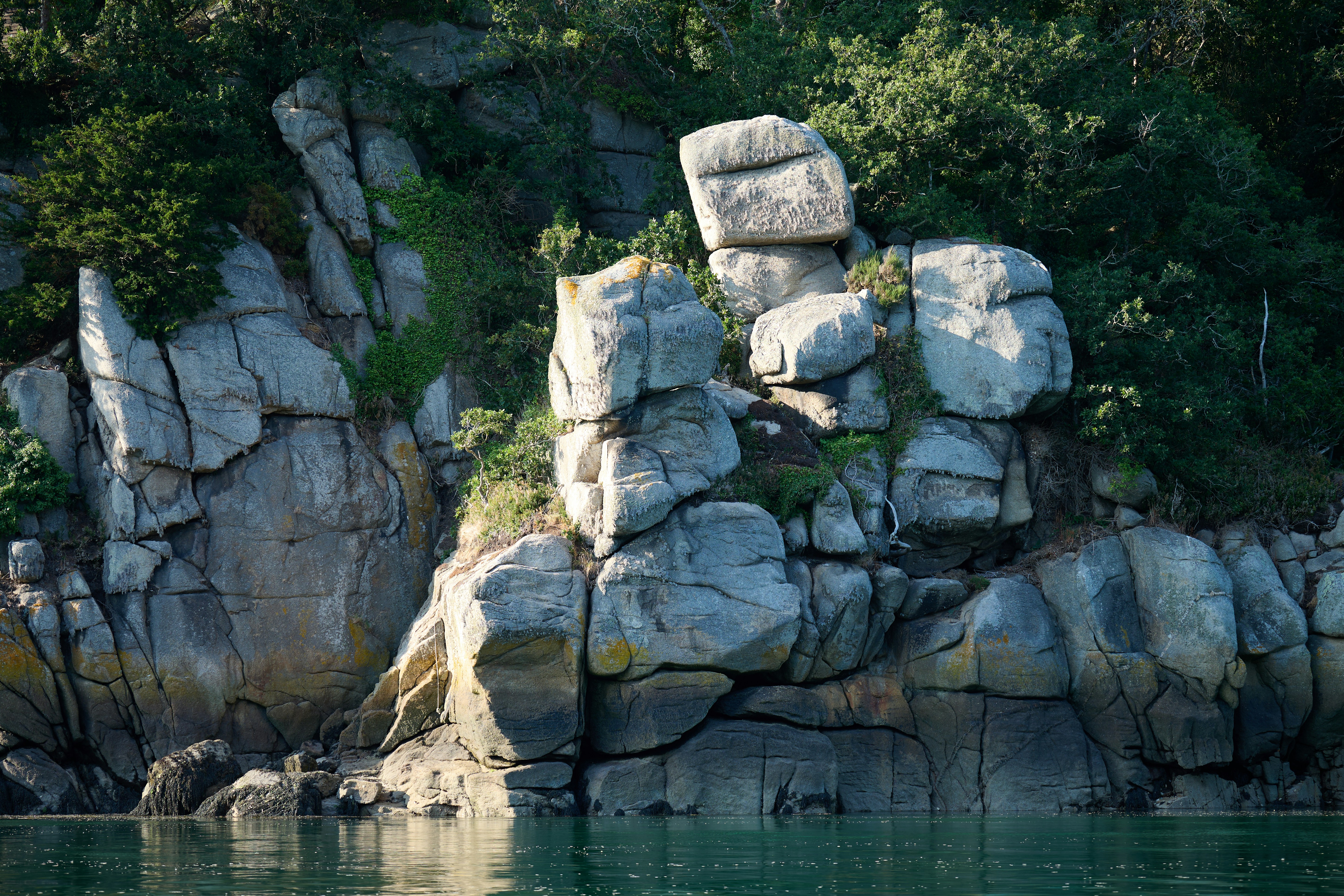 Granite Sentinel: Stoic Rocks Guarding the Quiet Inlet