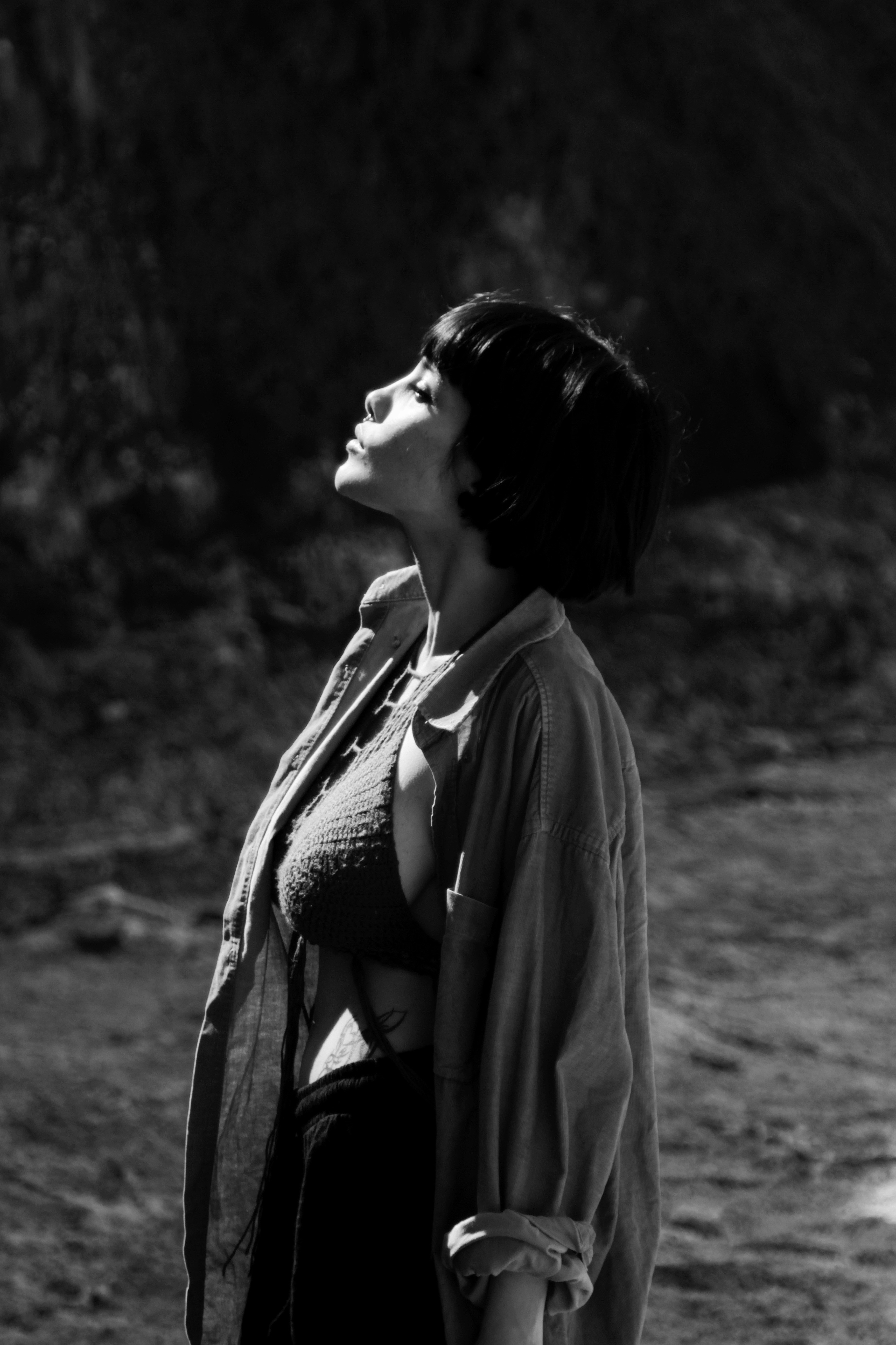 Silhouette of Quiet Resolve: A Portrait in Sunlit Contemplation