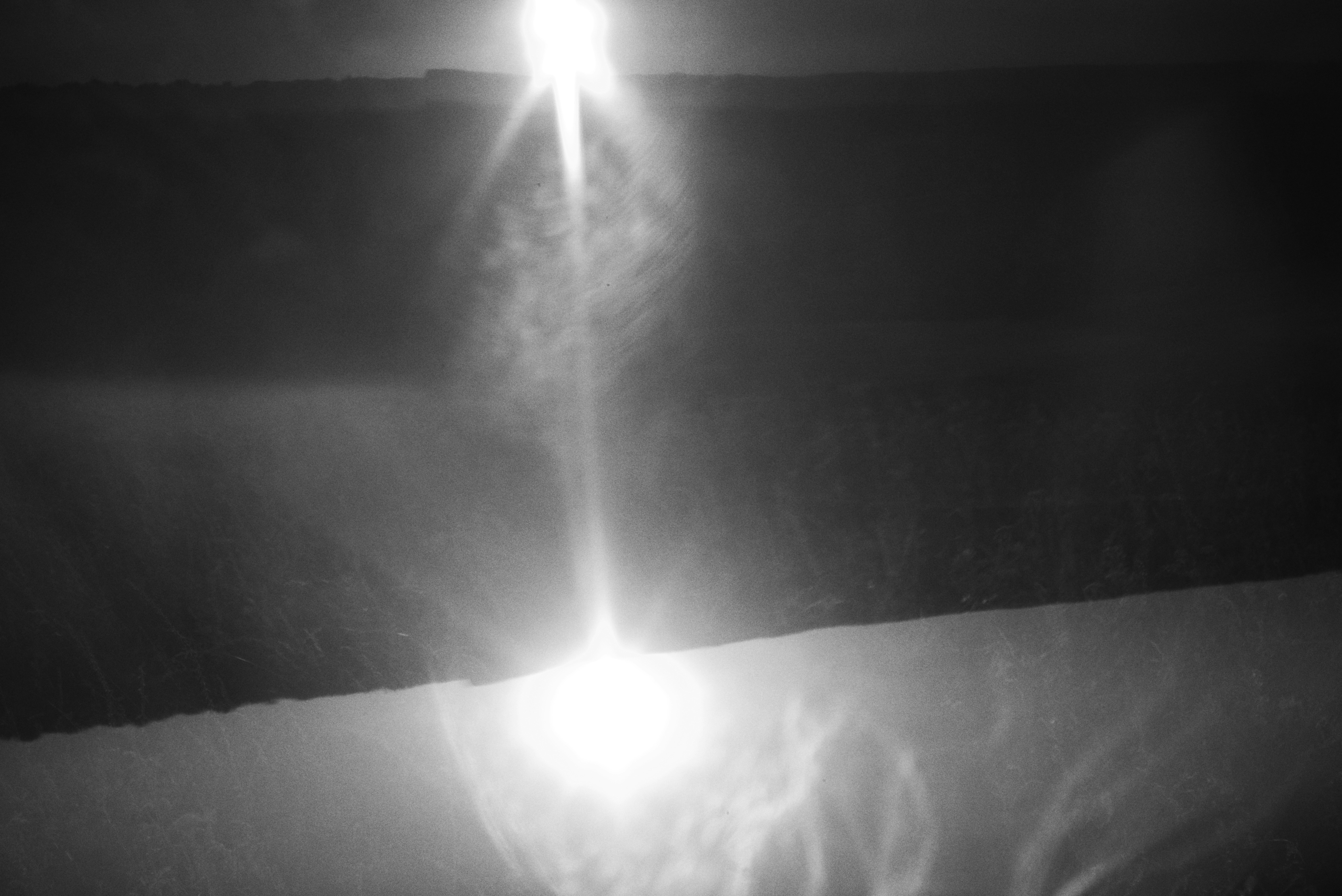 High-Contrast Reflections: A Quiet Moment of Light and Shadow