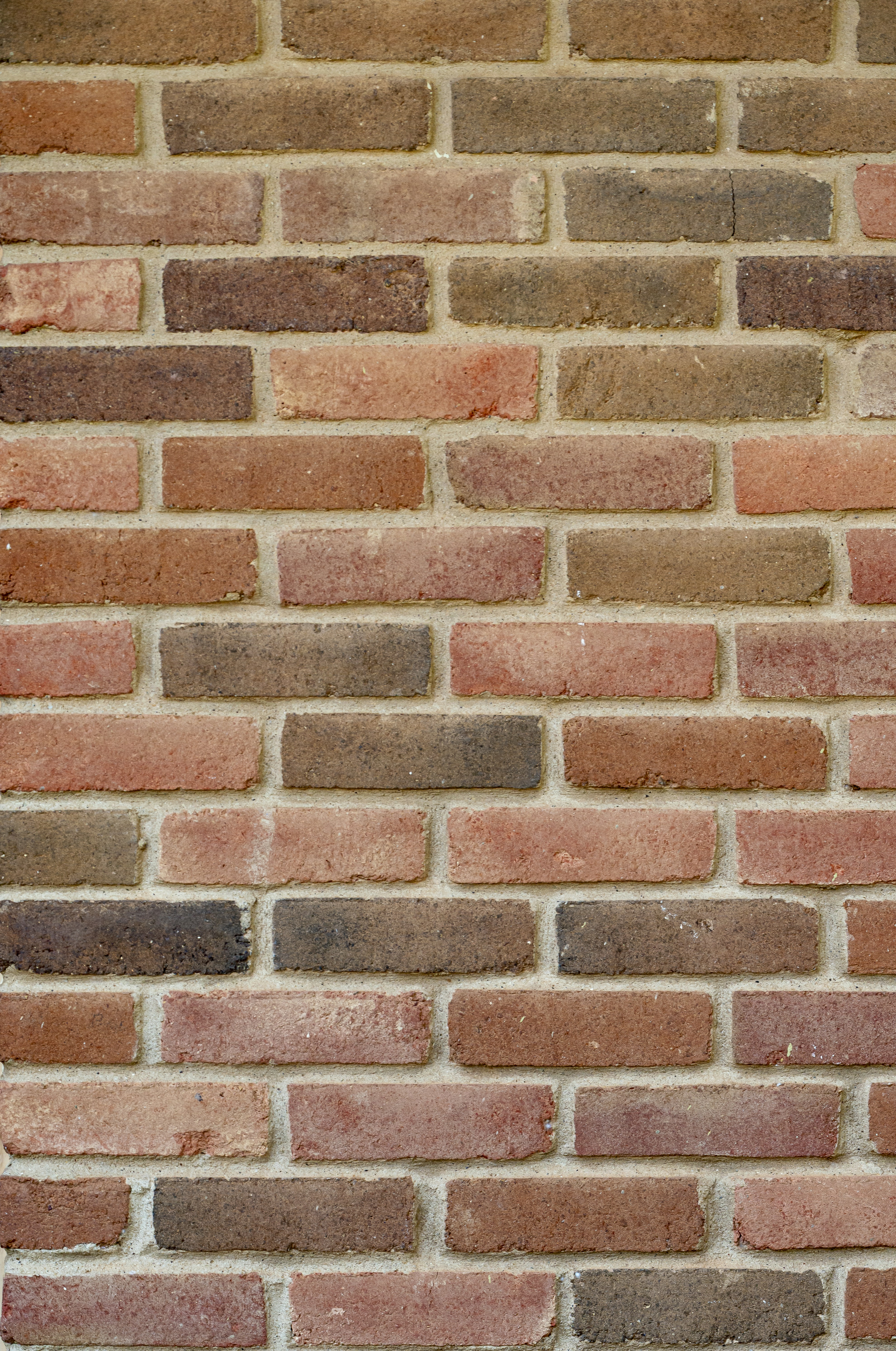 Brickwork Mosaic: A Symmetrical Tapestry of Red and Brown Bricks